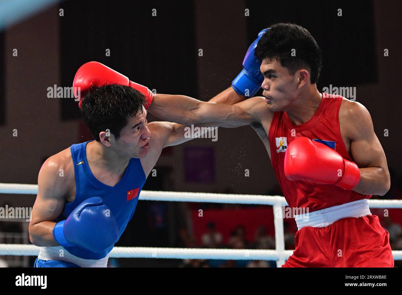 Mark Ashley Fajardo (R) of the Philippines and Xiangyang Wang of China ...