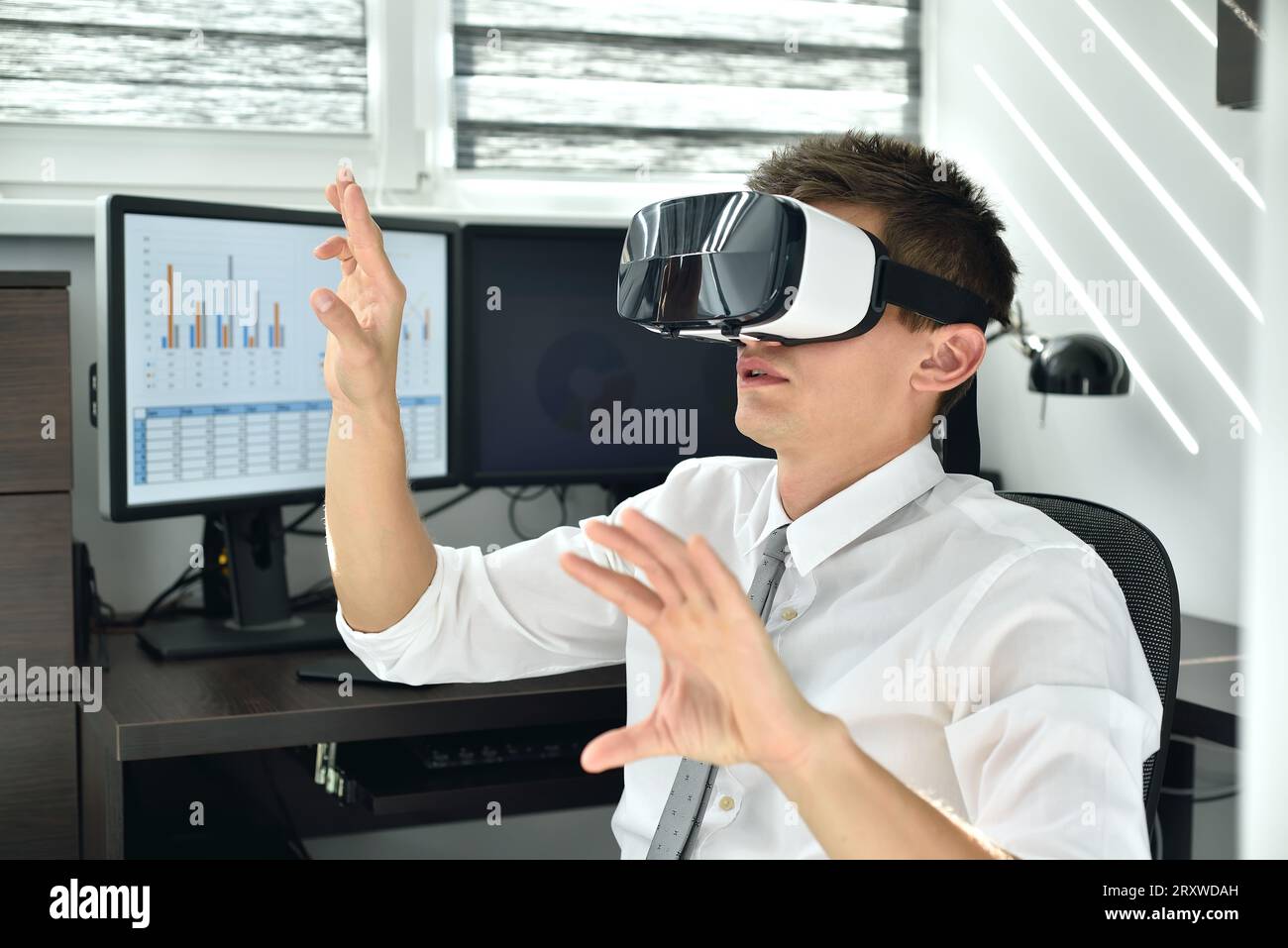 Young Manager Wearing a VR Headset. Interactive Business Working ...