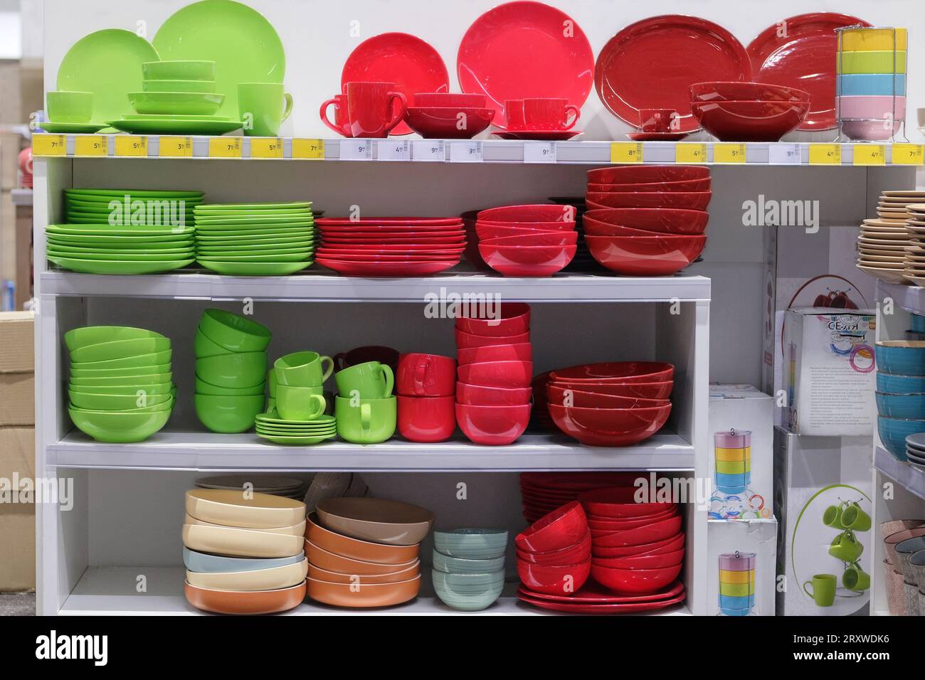 Kitchenware on shelf in supermarket Stock Photo - Alamy