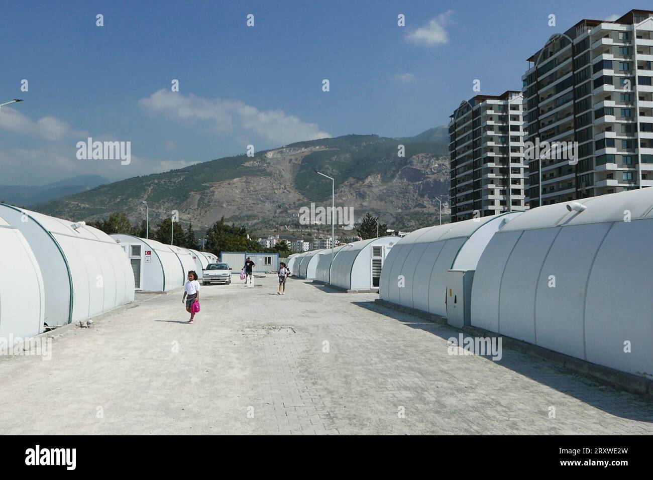 A shot of a temporary settlement for Syrian refugees displaced by ...