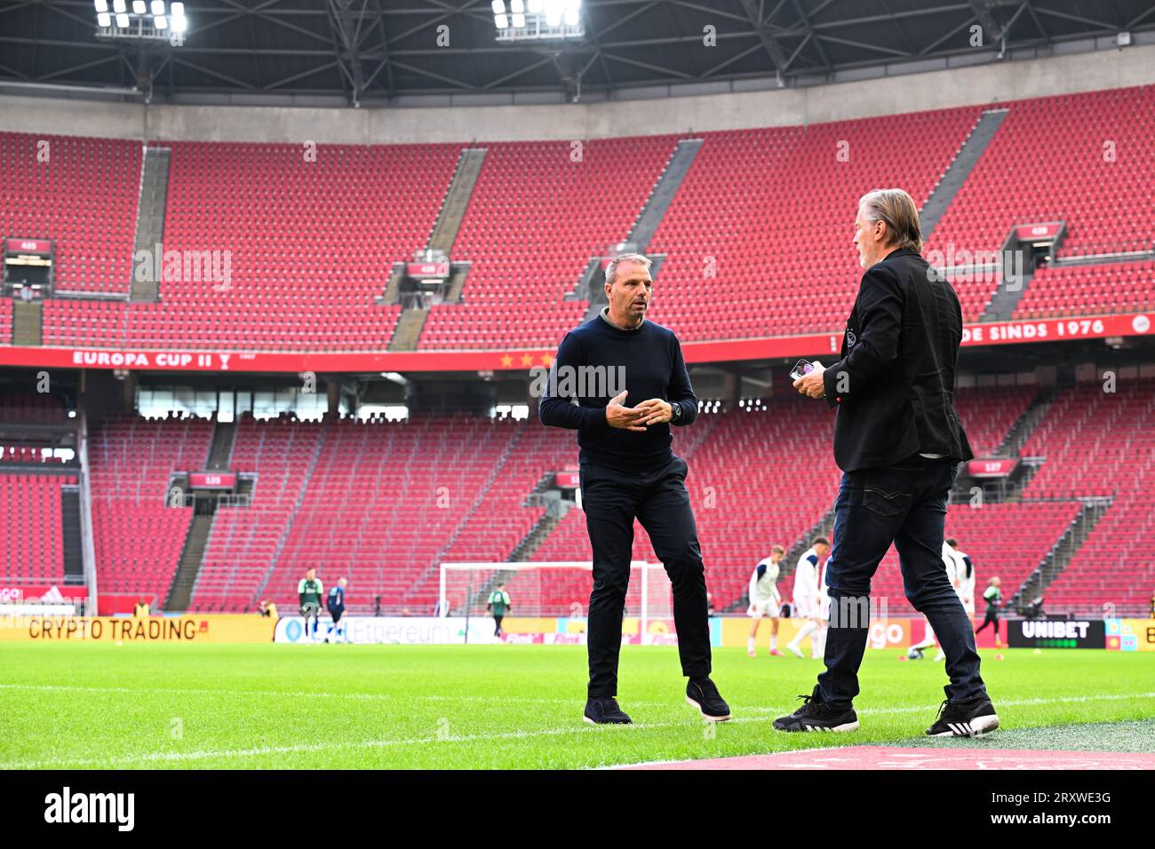 AMSTERDAM - 27/09/2023, AMSTERDAM - Ajax coach Maurice Steijn and Ajax ...