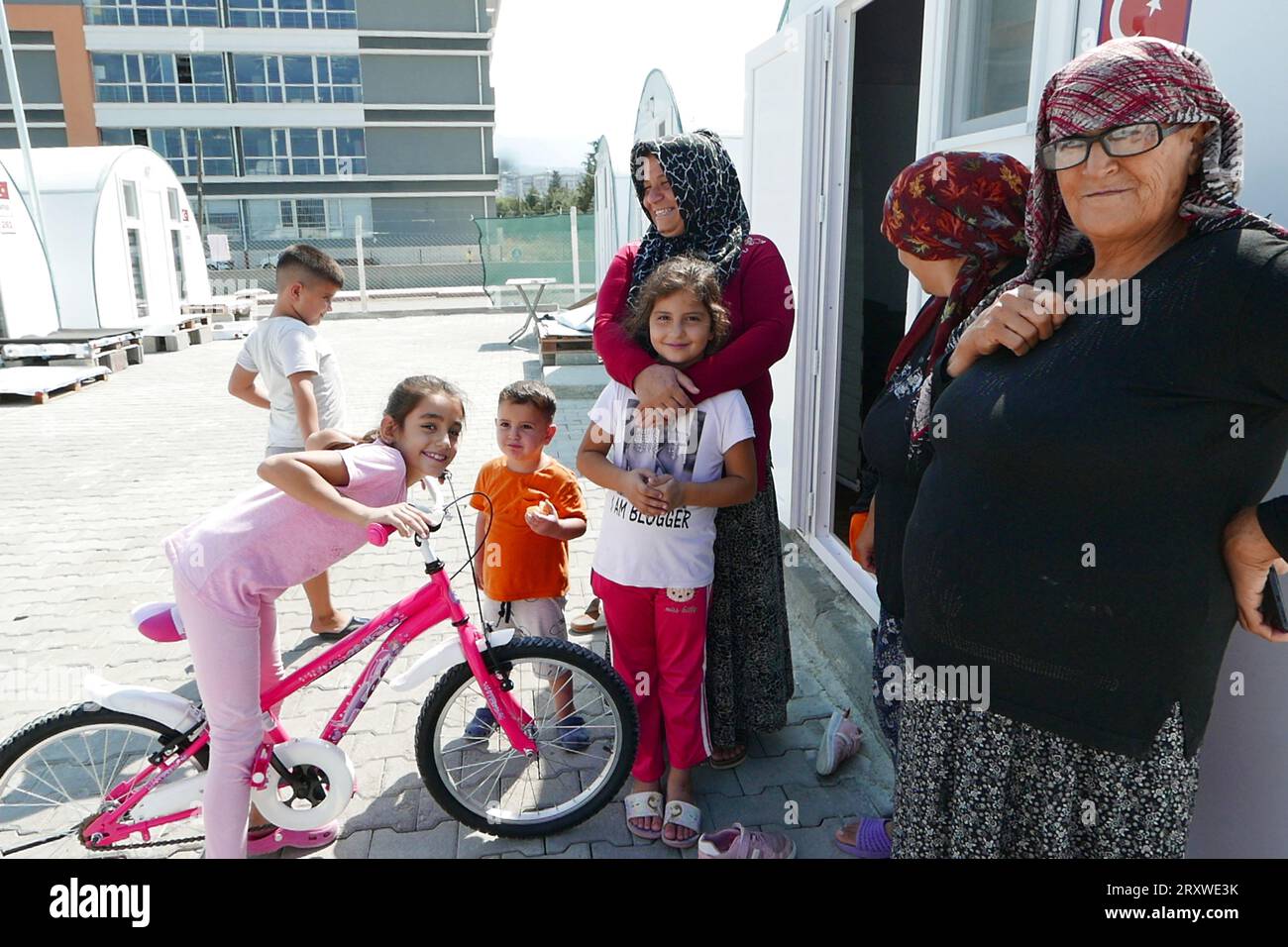 Syrian family seen in a temporary settlement for Syrian refugees ...