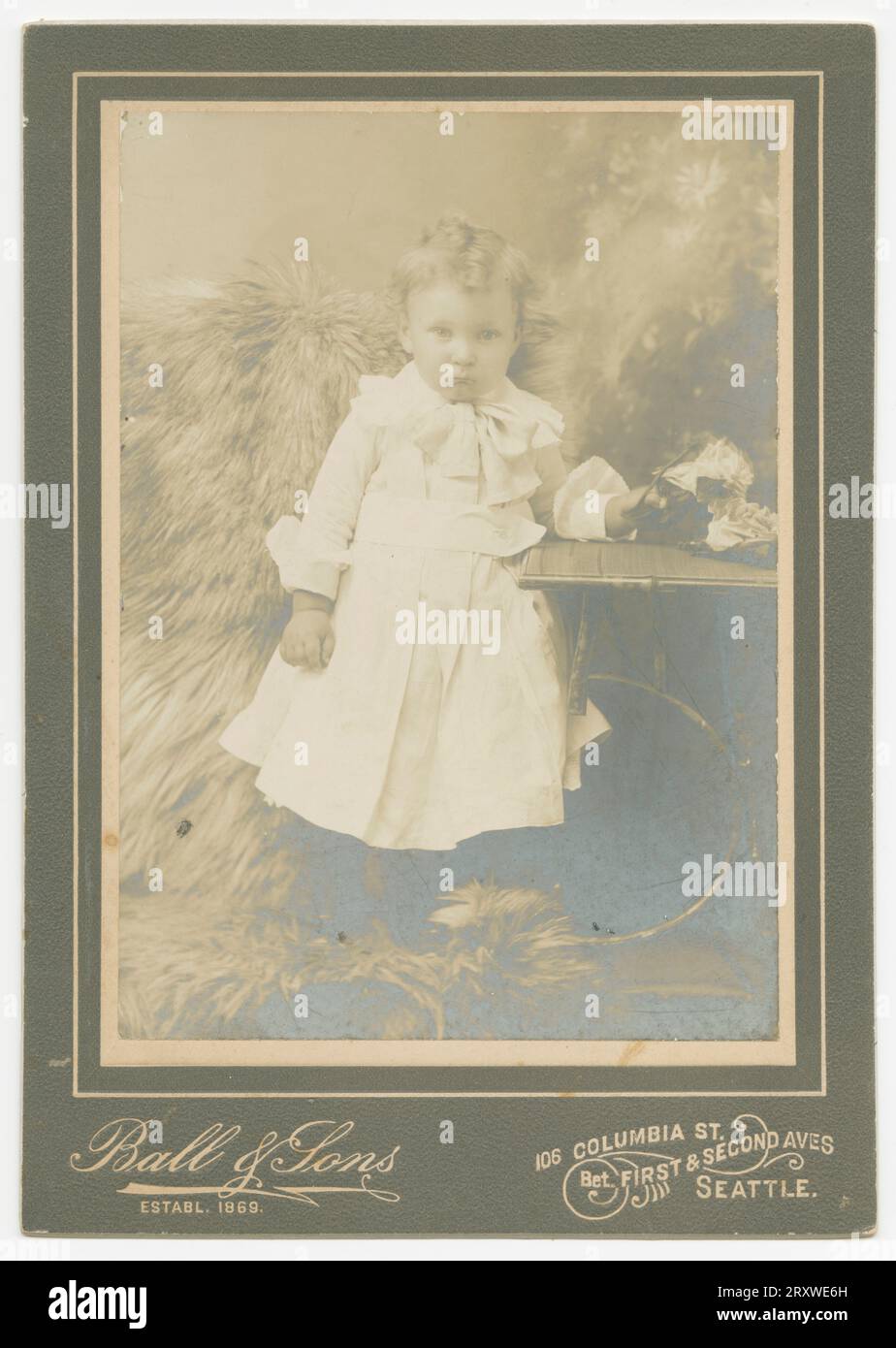 A black-and-white photograph of a woman photographed at the Ball & Sons ...