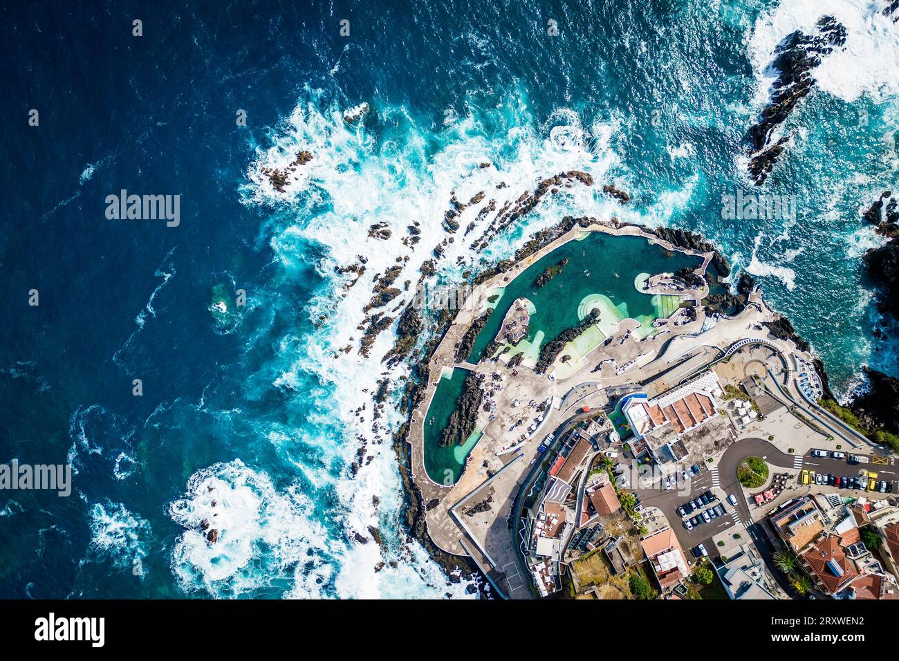 Fantastic bird's eye view of people swimming in the natural lava pools ...