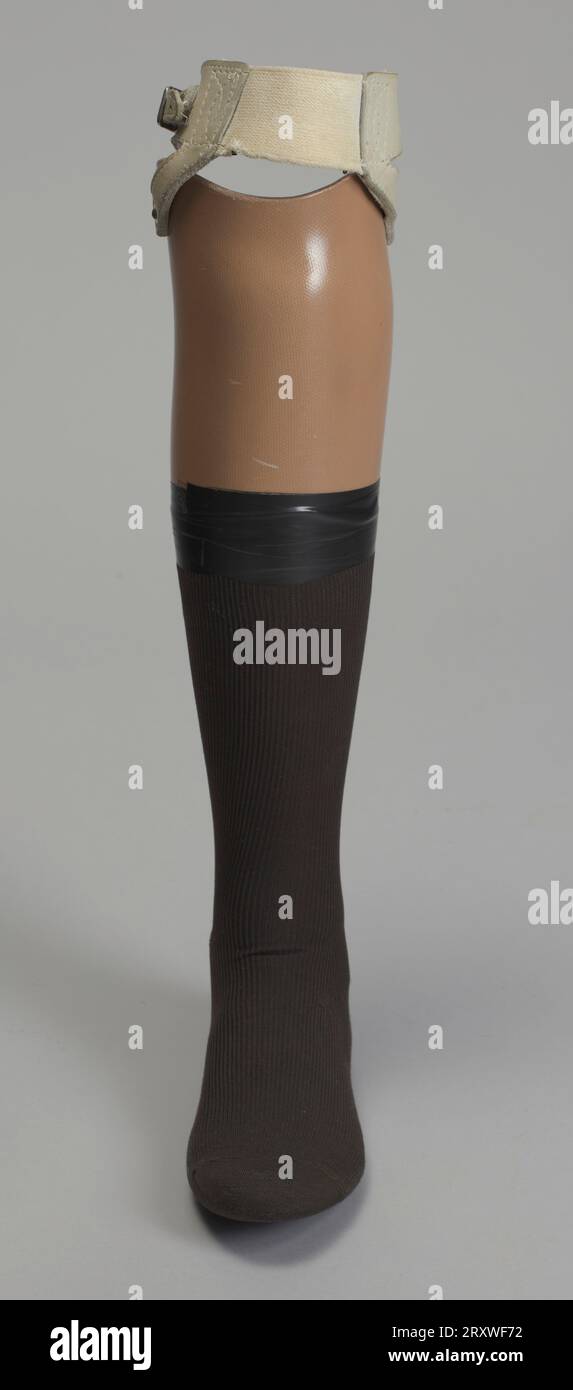 A solid fiberglass prosthetic left leg (including below knee, calf ...