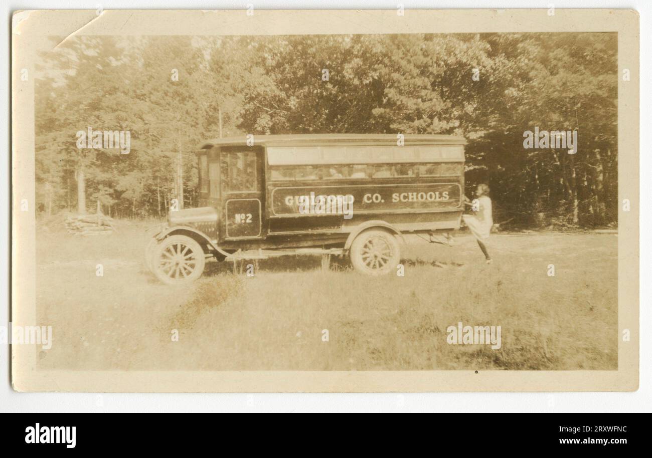 Photograph of a Guilford County school bus and school children ca. 1916 ...