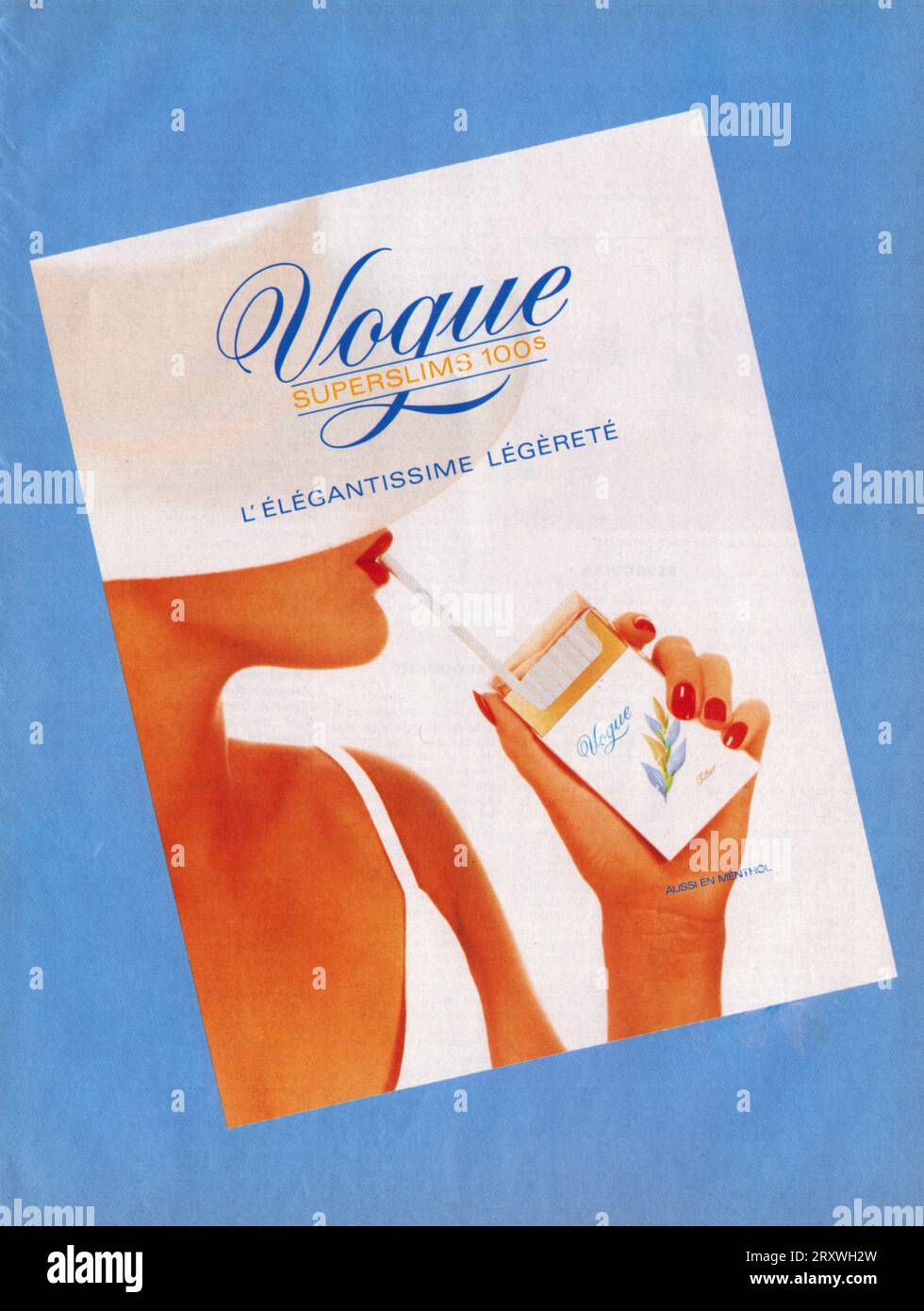 Woman smoking vogue cigarettes hi-res stock photography and images - Alamy