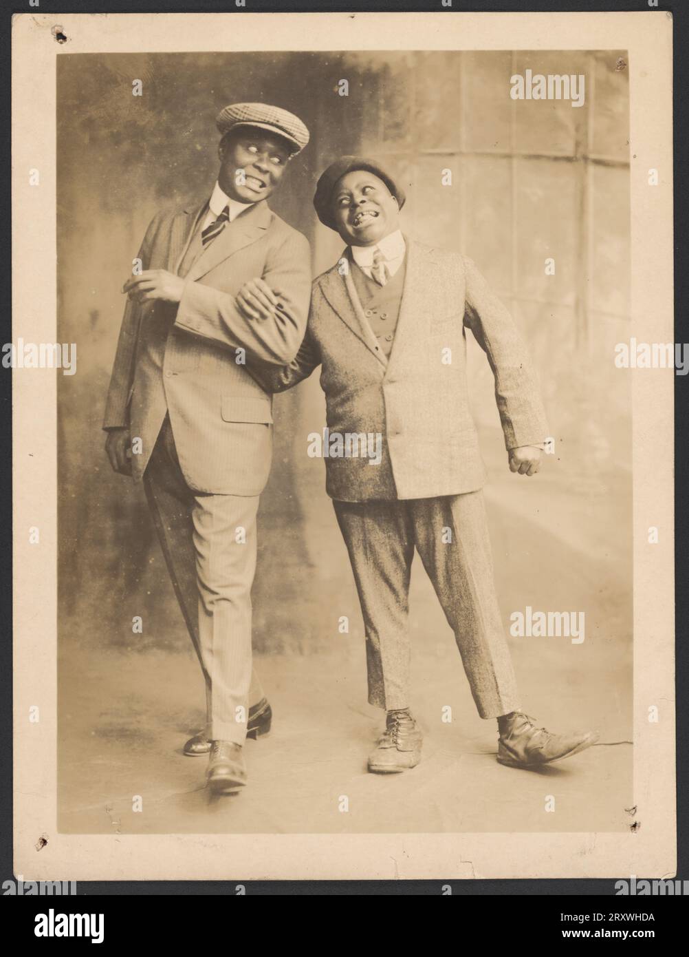 Photograph of two men linking arms 1910s - 1920s Stock Photo - Alamy