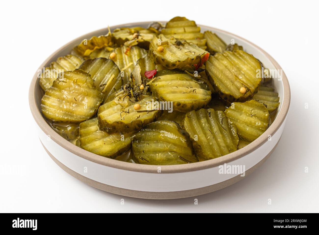 Dill pickles on a white background Stock Photo - Alamy