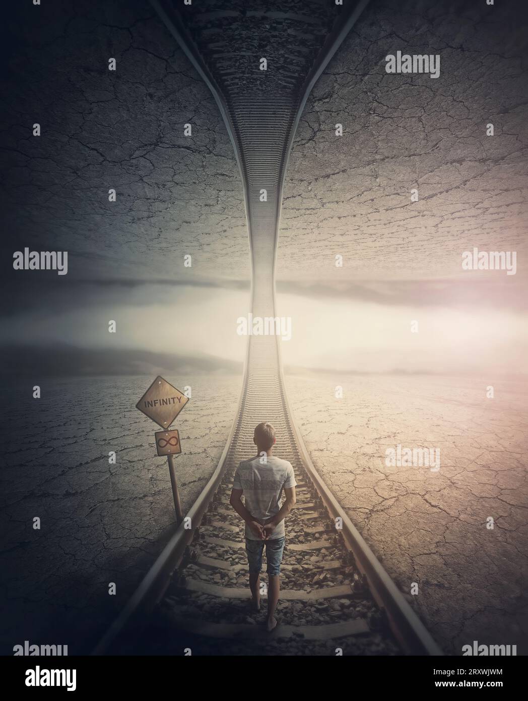 Infinity road concept with a man walking the railway to the parallel ...