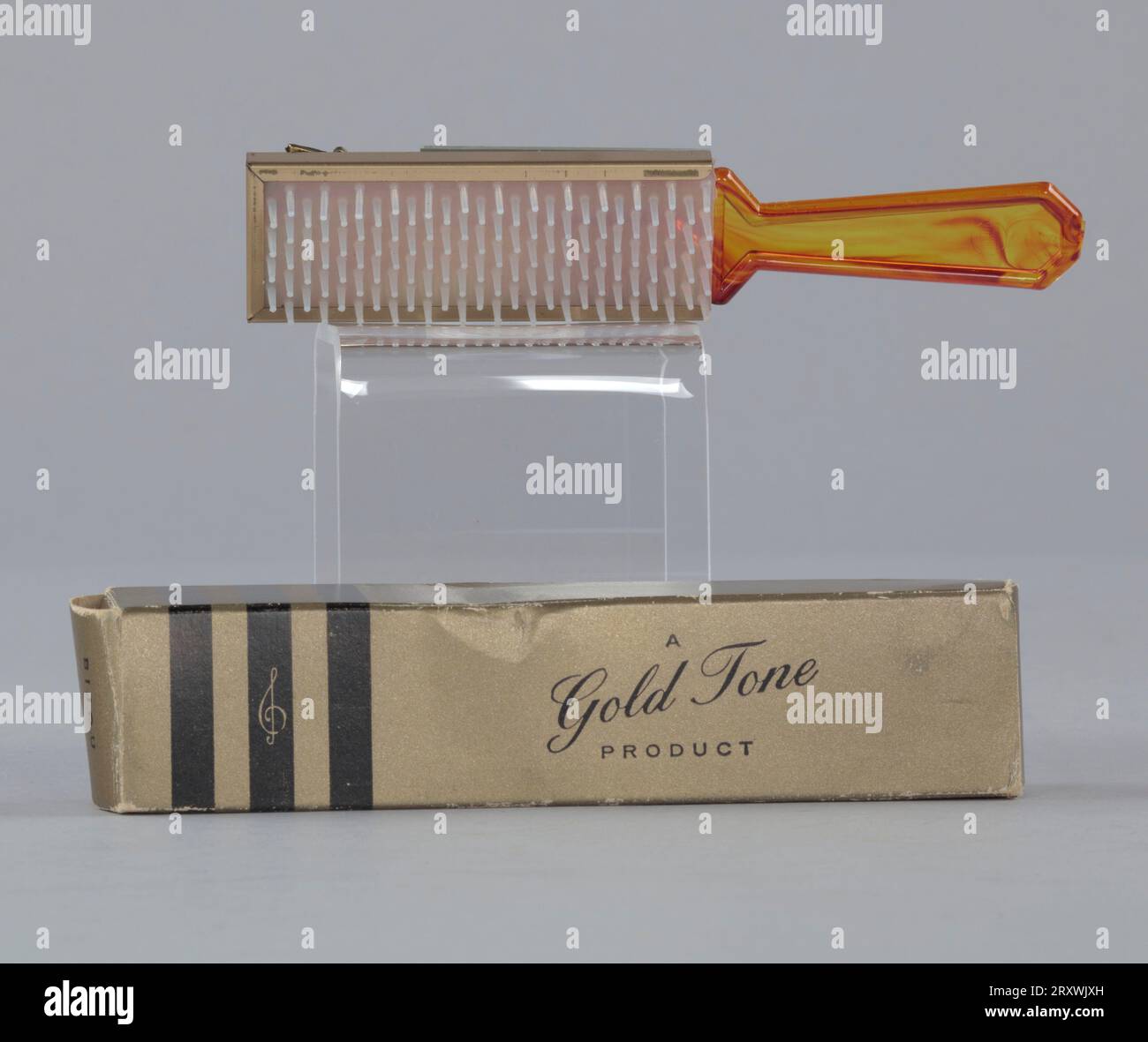 Plastic brush with box from Mae's Millinery Shop 1941-1994 Stock Photo ...