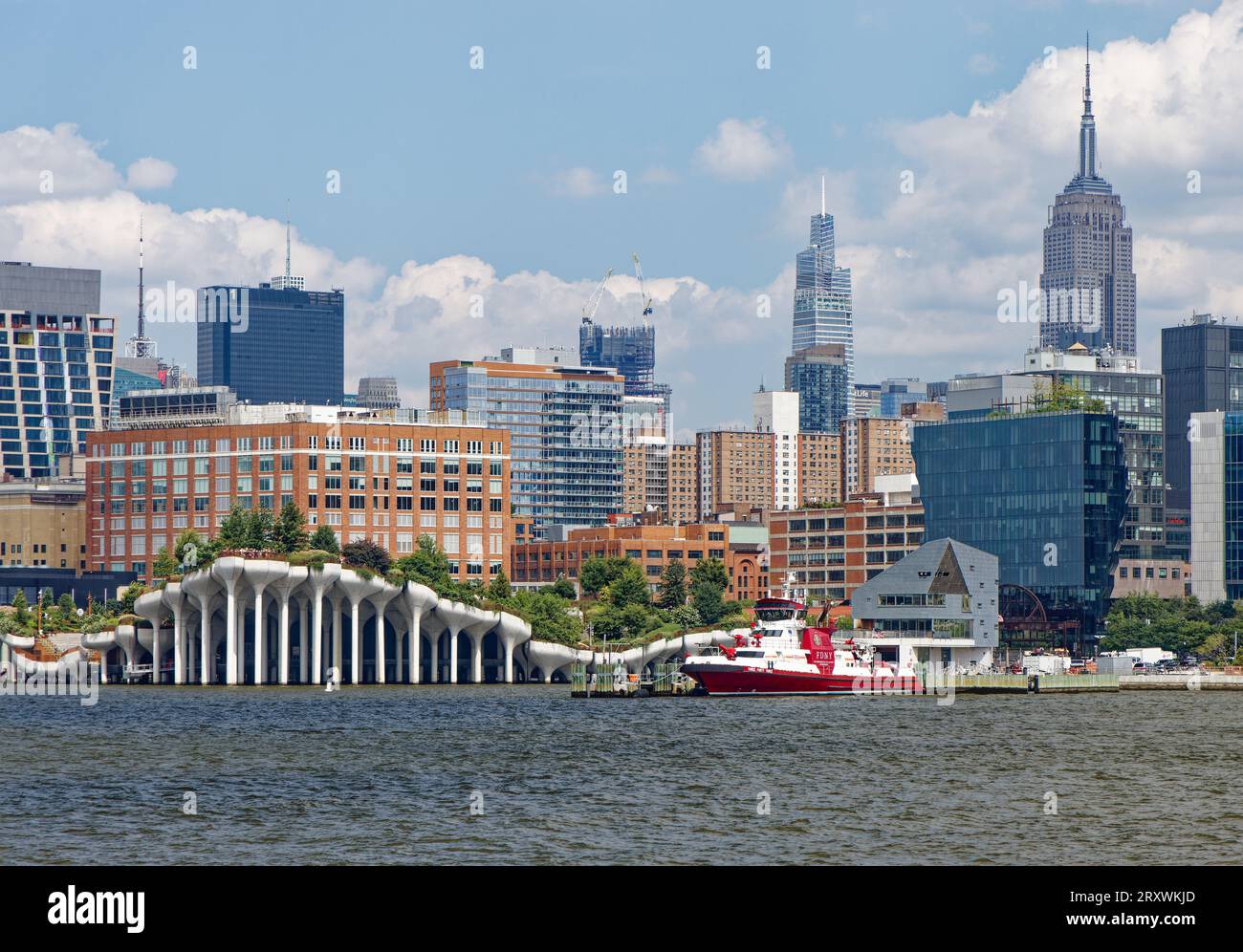Little Island rises on precast cement “tulip pot” stilts; two foot ...