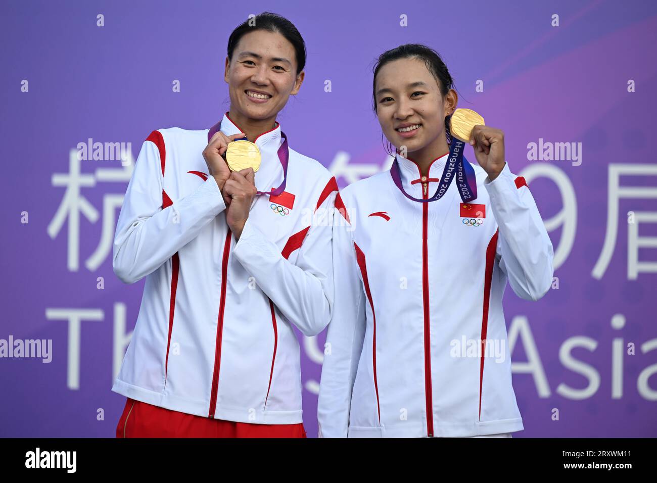NINGBO, Sept. 27, 2023 (Xinhua) -- Gold Medalists Xue Chen (L)/Xia Xinyi of China attend the ...