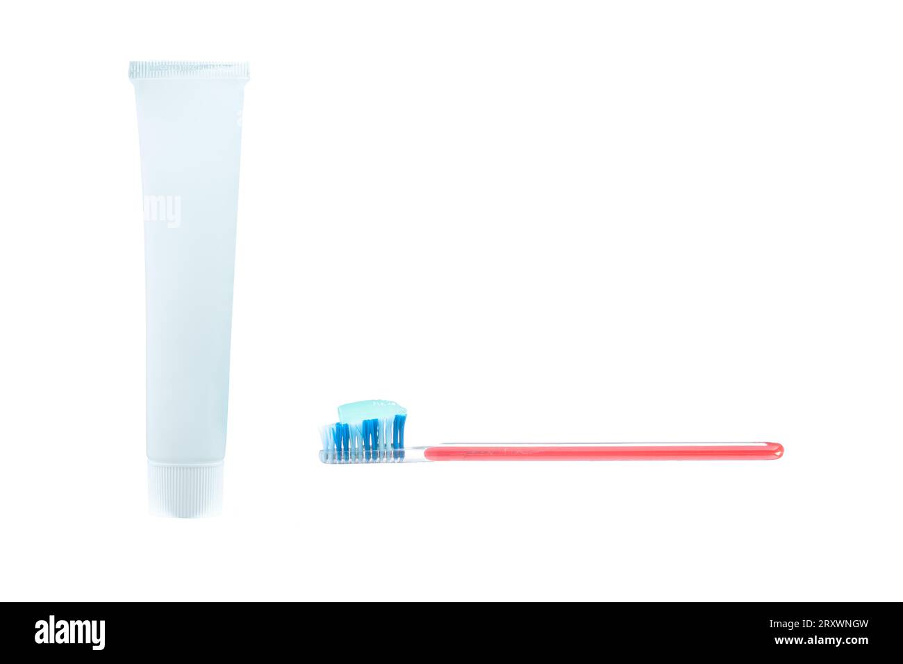 toothbrush and tube of toothpaste isolated on white background Stock ...