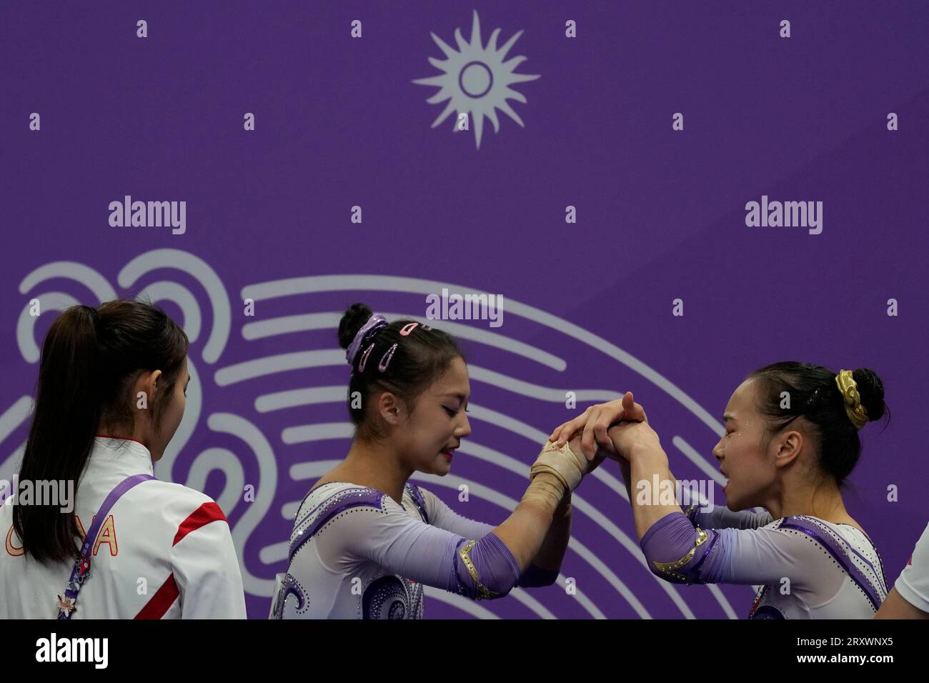 China's Zuo Tong and China's Zhang Jin at right, cheer each other on ...