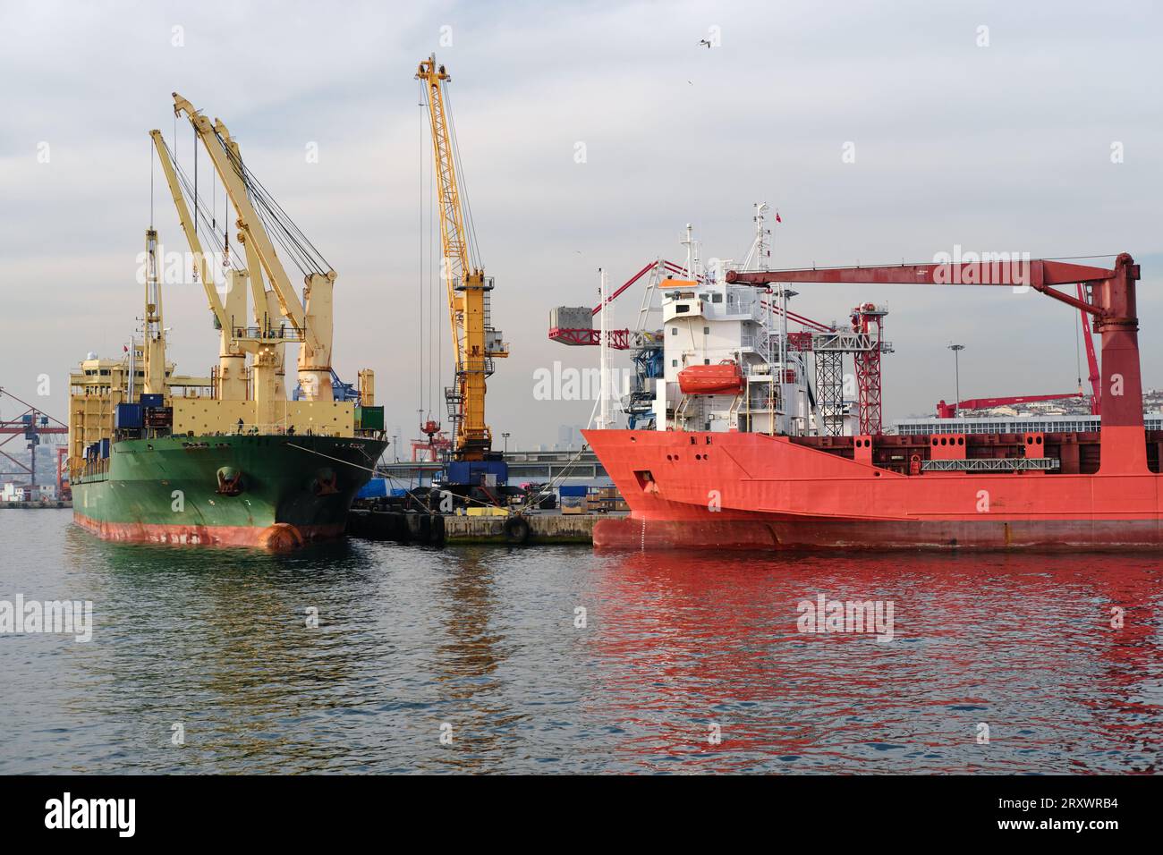 Two ships in the shipyard docking transporting containers Stock Photo ...
