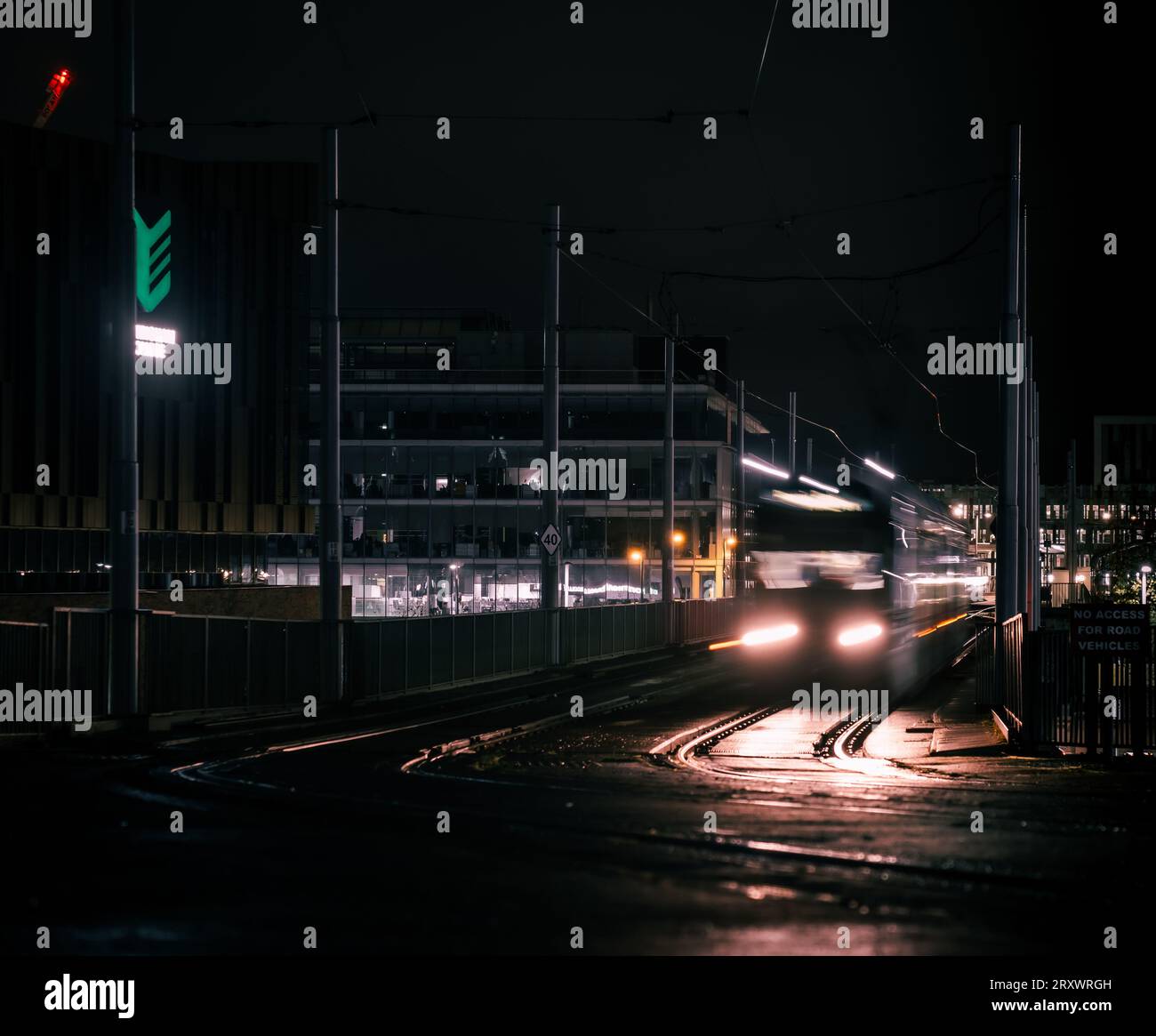 Nottingham tram light trail at night hi-res stock photography and ...