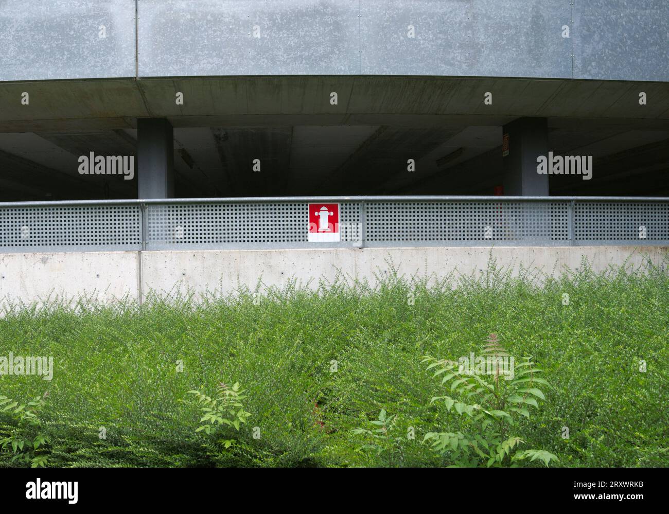 parking garage with fire hydrant sign Stock Photo - Alamy