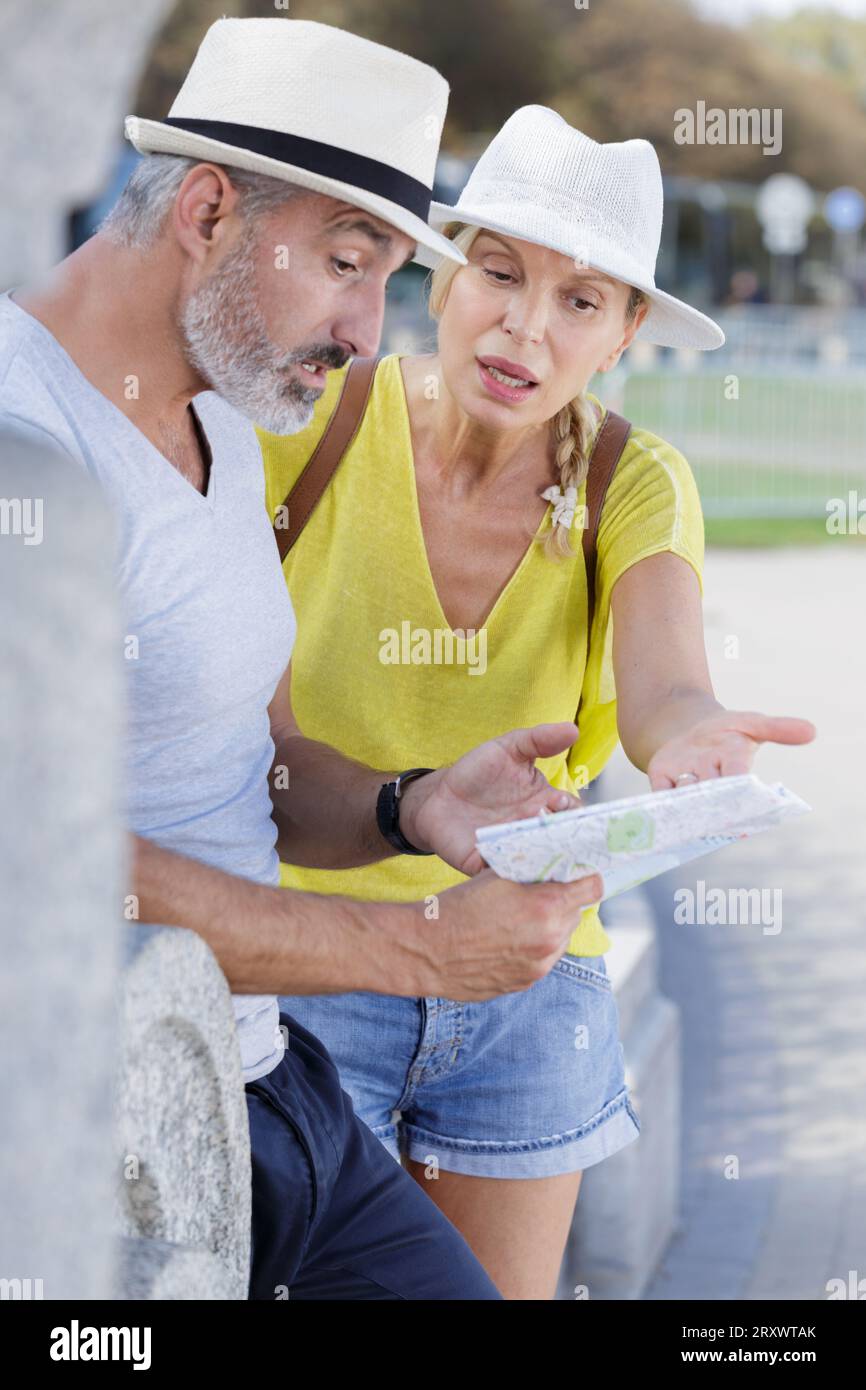 senior tourist couple lost while having an argument outdoors Stock ...