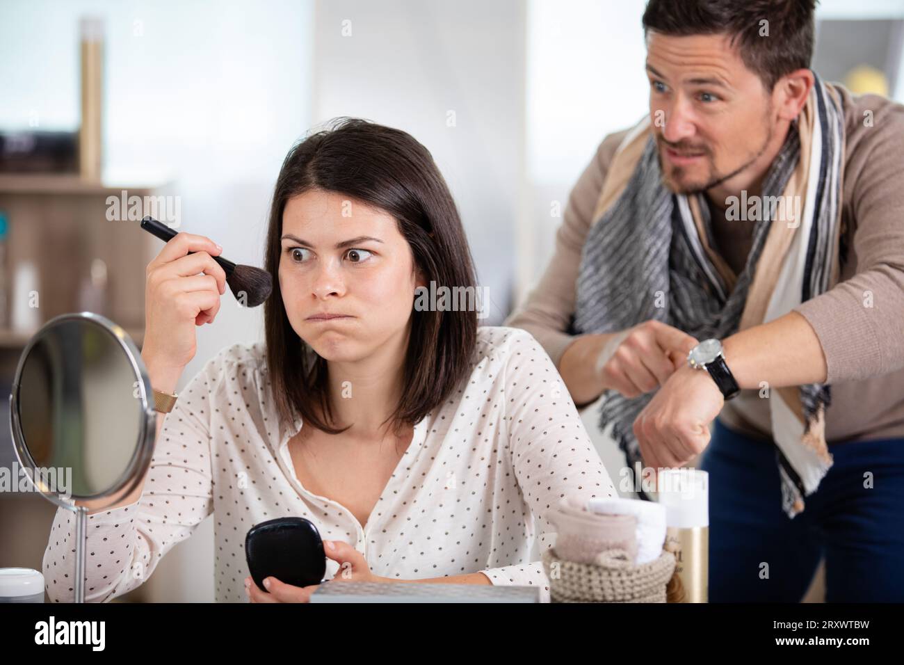 impatience upset and angry husband rushing his wife Stock Photo - Alamy