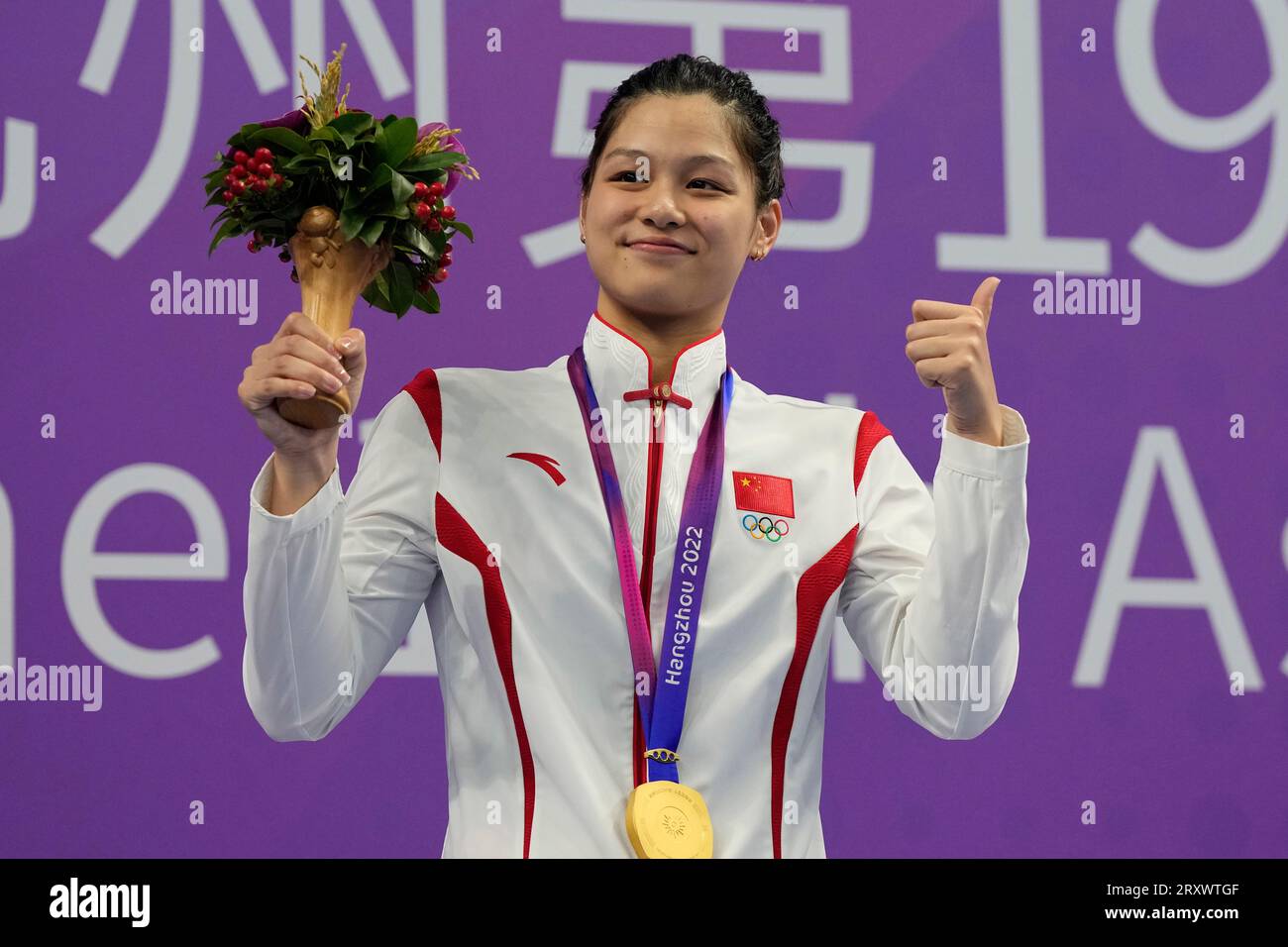 Gold medalist China's Yu Yiting celebrates on the podium during the ...