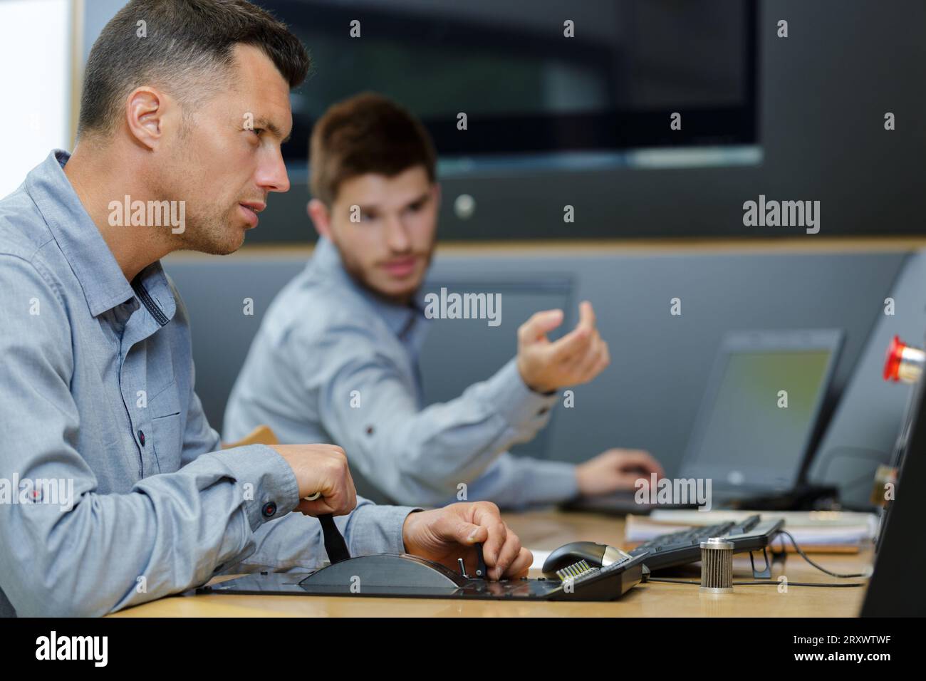 portrait of computer engineering worker Stock Photo - Alamy