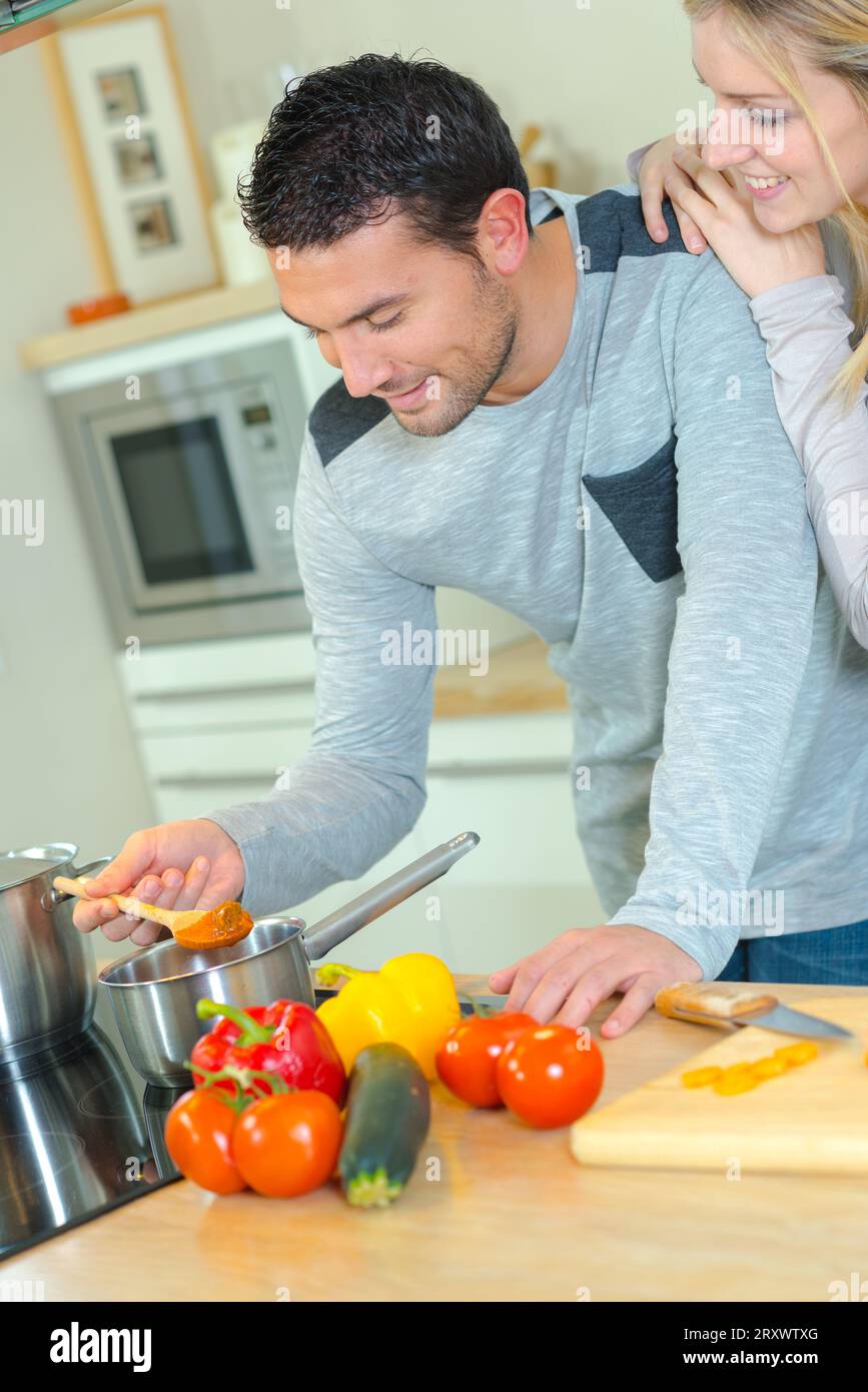 a couple is cooking lunch Stock Photo - Alamy