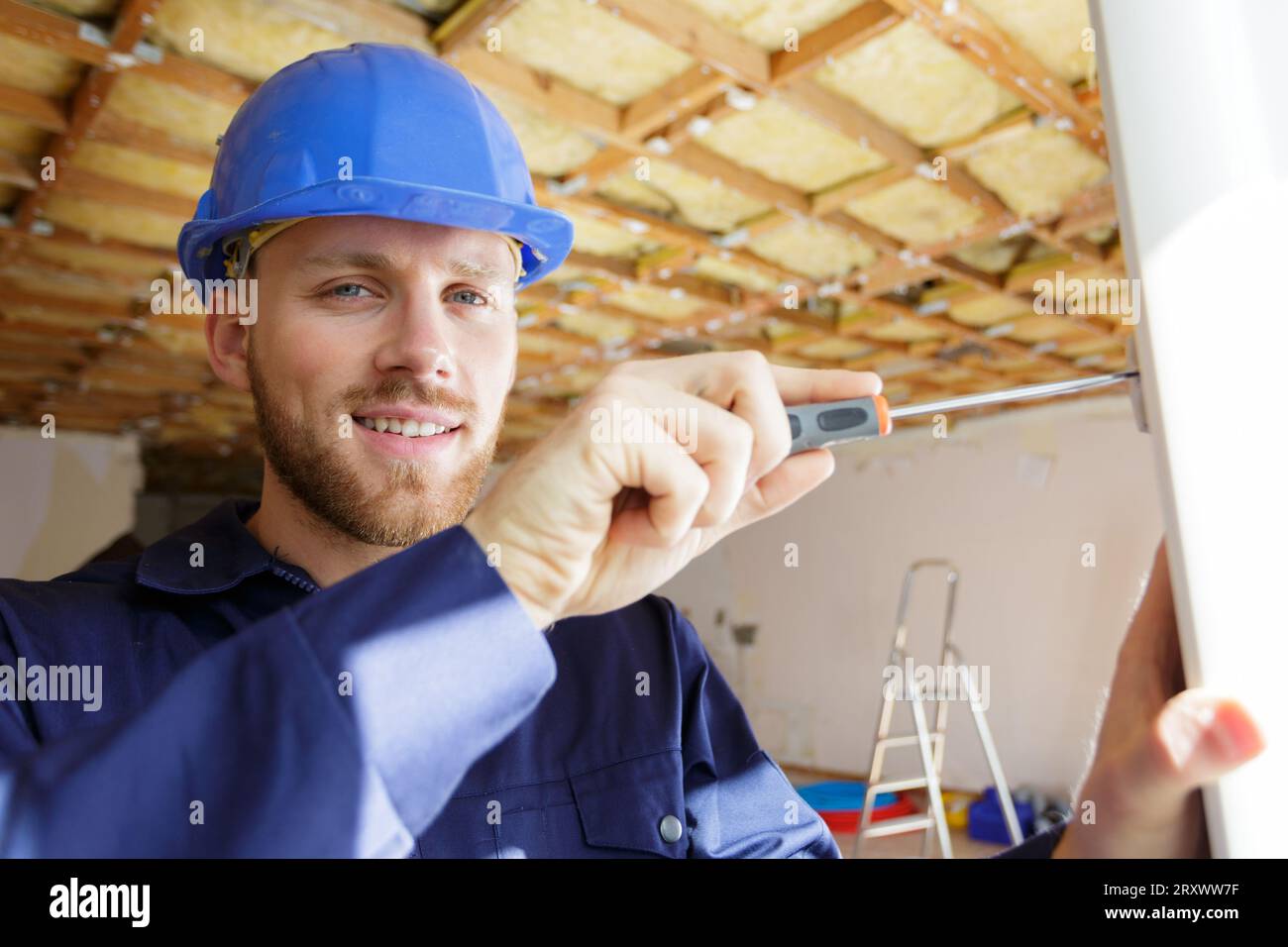 Man repairing a door lock hi-res stock photography and images - Alamy