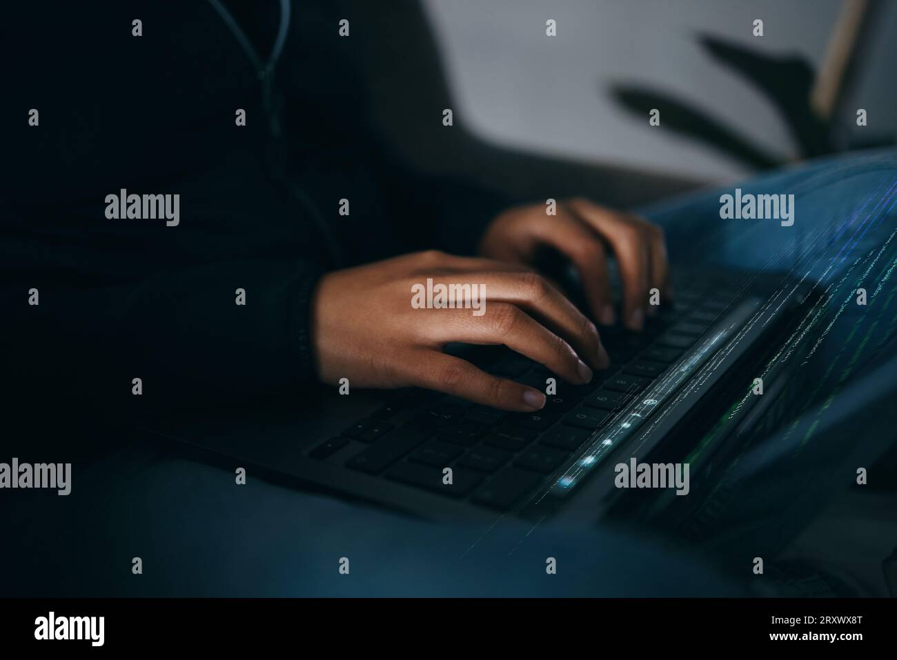 Hacker, hands typing on laptop and information technology for coding and database with phishing ...