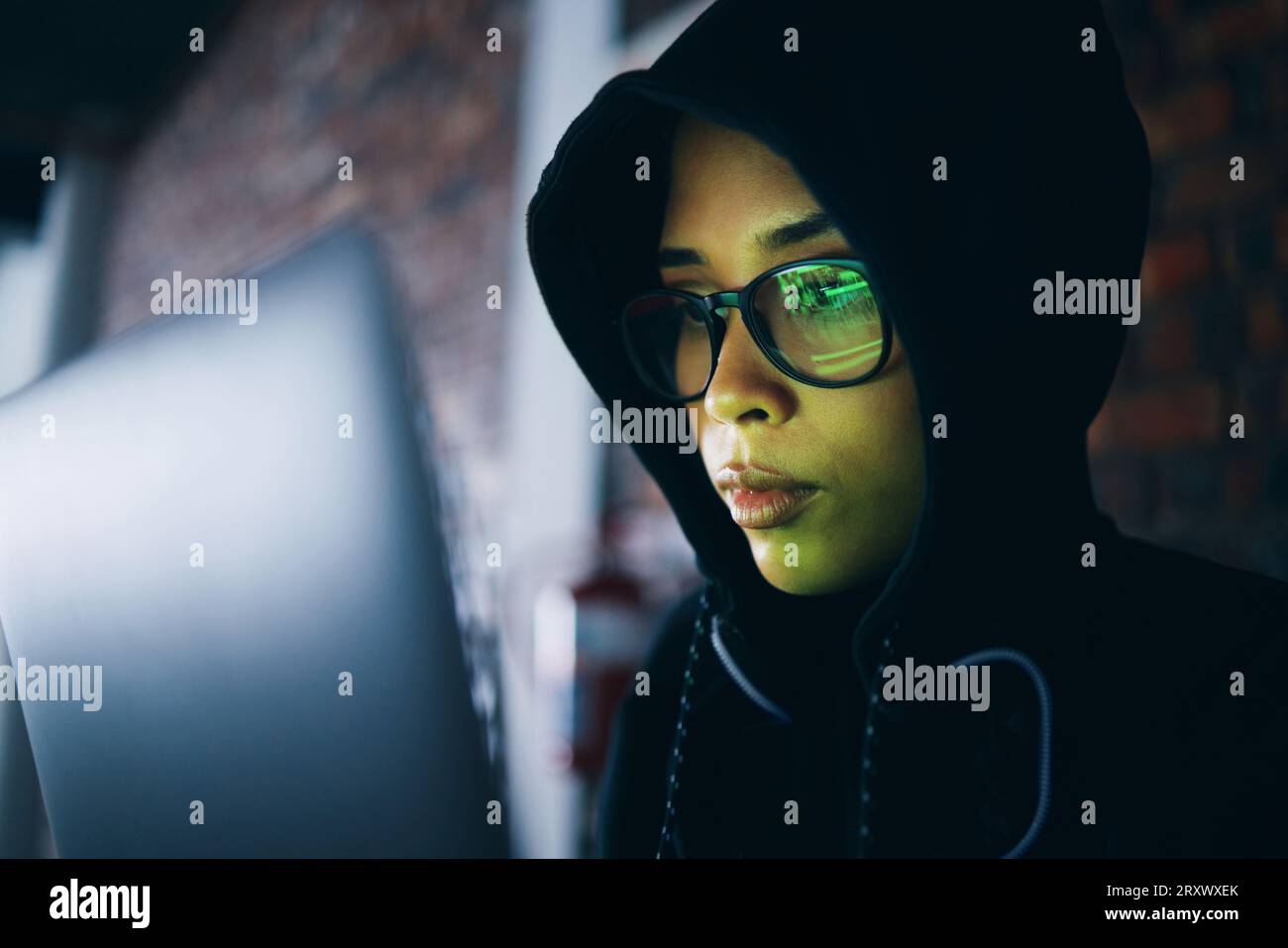 Hacker Woman In Dark Room With Laptop And Coding Phishing And Cyber Crime With It Database Or