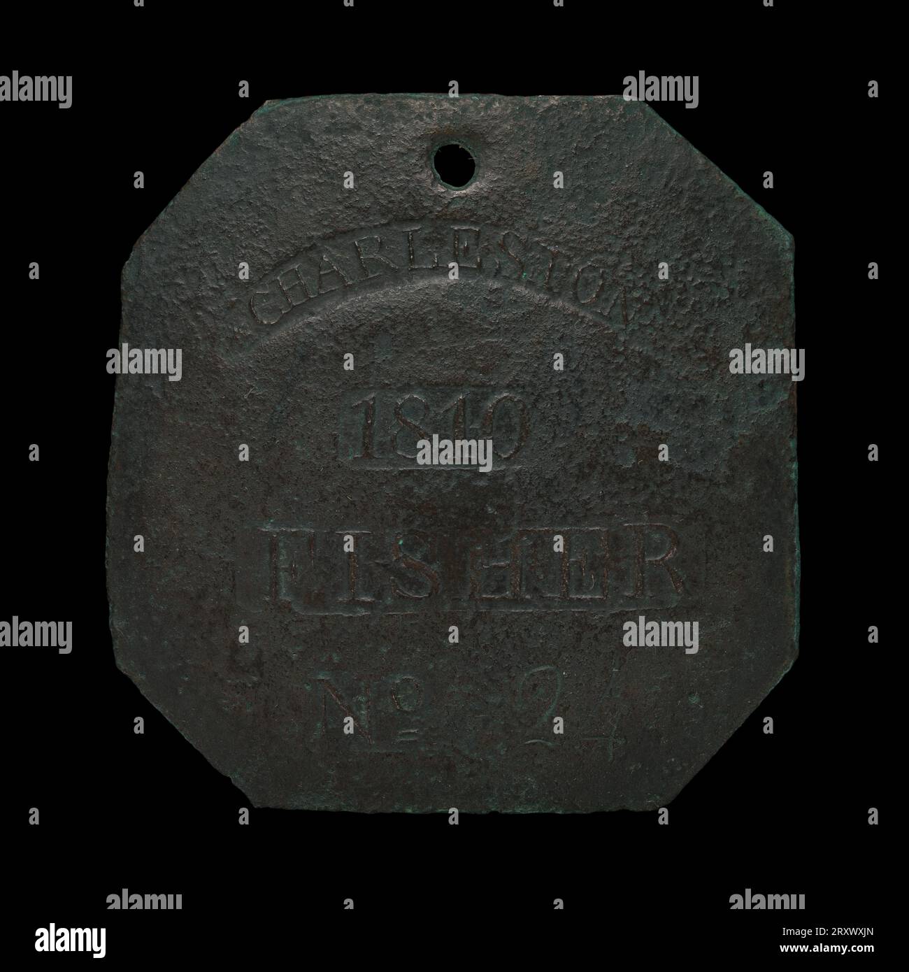 Charleston slave badge from 1810 for Fisher No. 24 1810 Stock Photo - Alamy