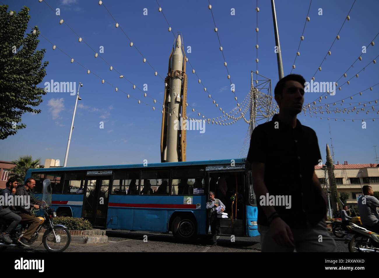 September 26, 2023, Tehran, Iran: Vehicles and Pedestrians move past an ...