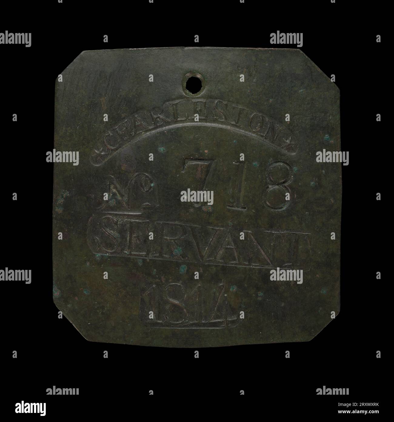 Charleston slave badge from 1814 for Servant No. 718 1814 Stock Photo ...