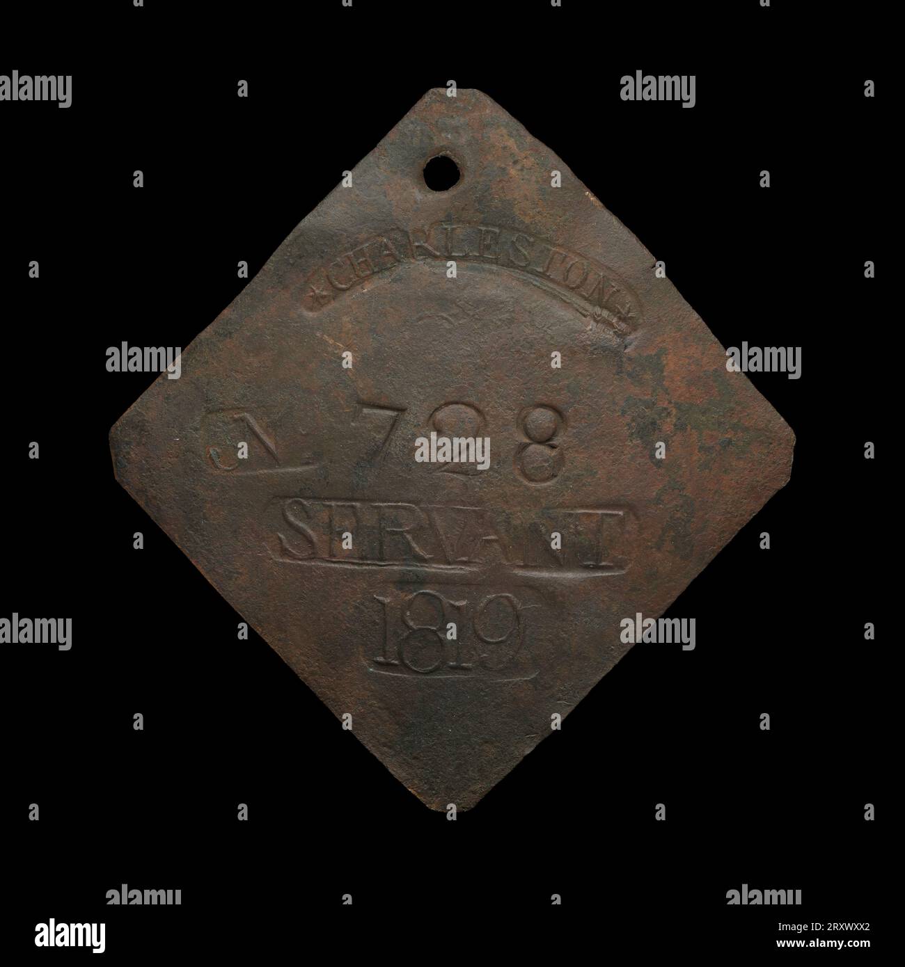 Charleston slave badge from 1819 for Servant No. 728 1819 Stock Photo ...