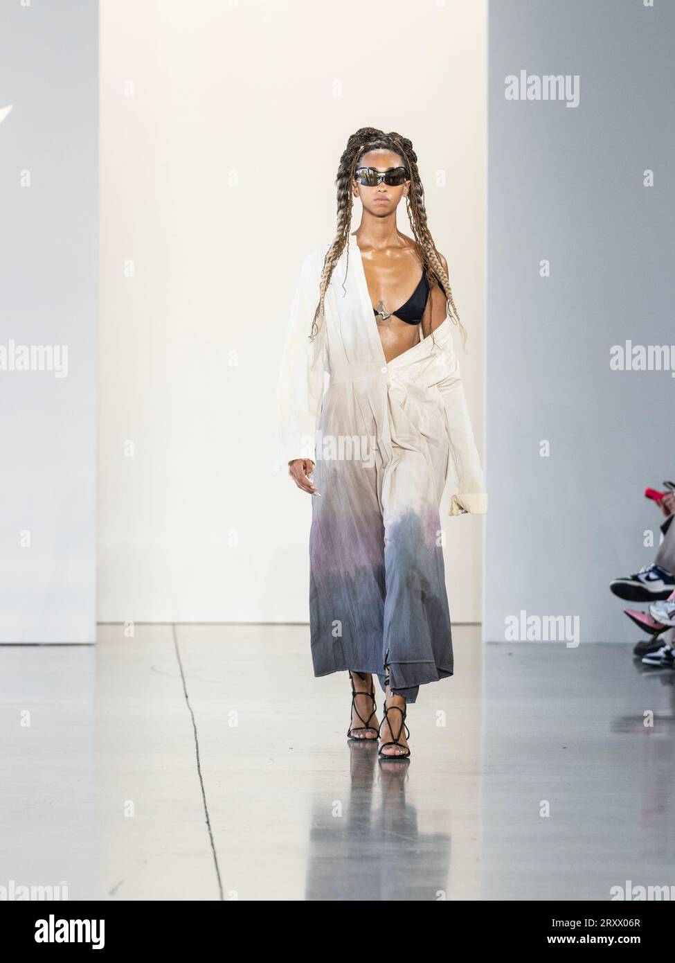 Model walks runway showing design by Jenny Kim and Haeun Lee for Kimmy ...