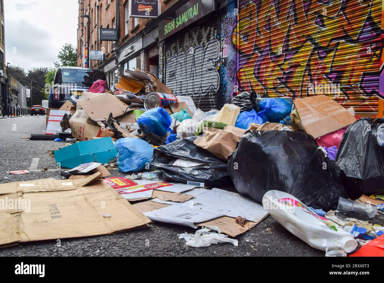 London, UK. 27th September 2023. Huge piles of garbage line the streets ...