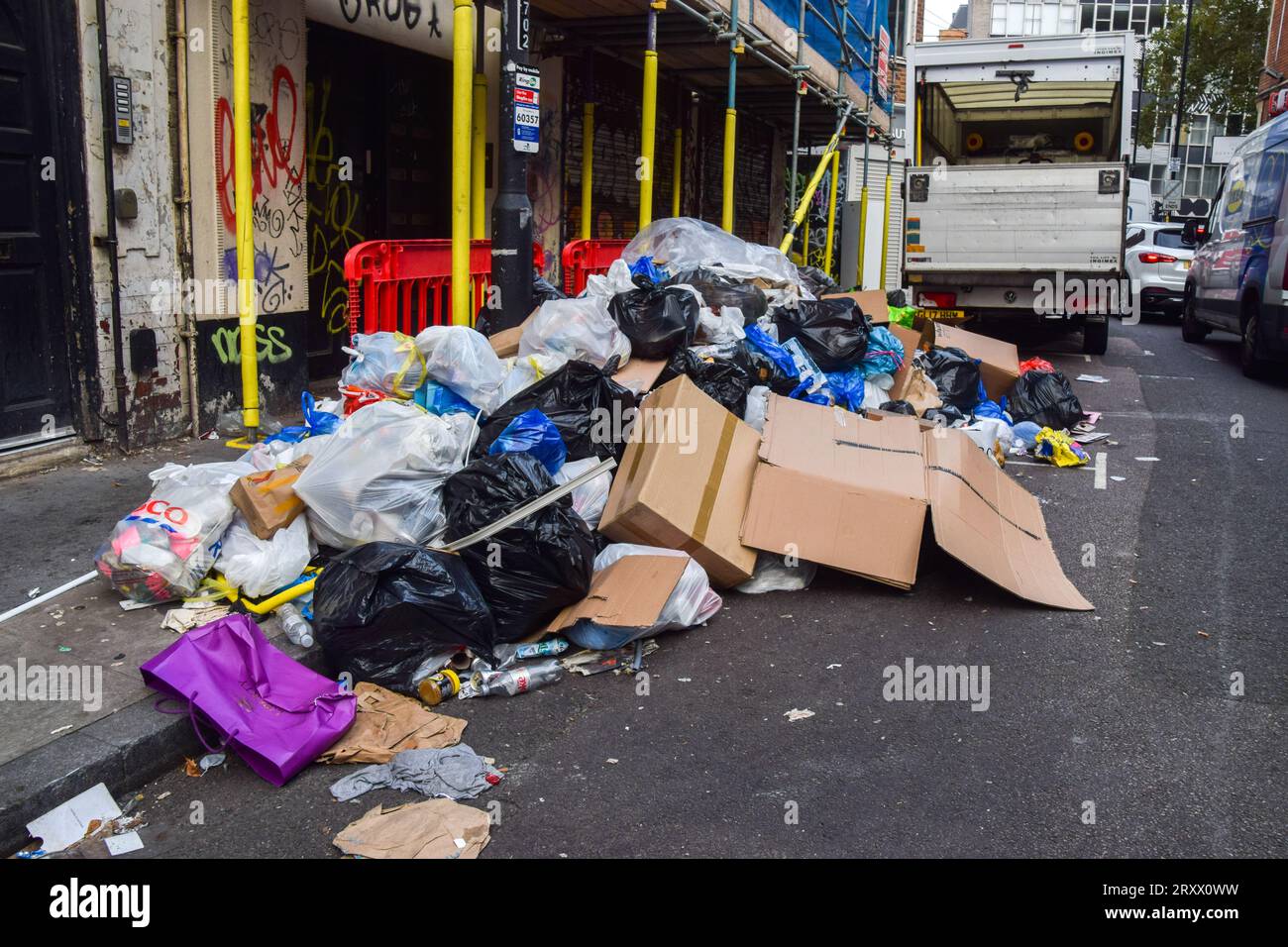 London, UK. 27th September 2023. Huge piles of garbage line the streets ...