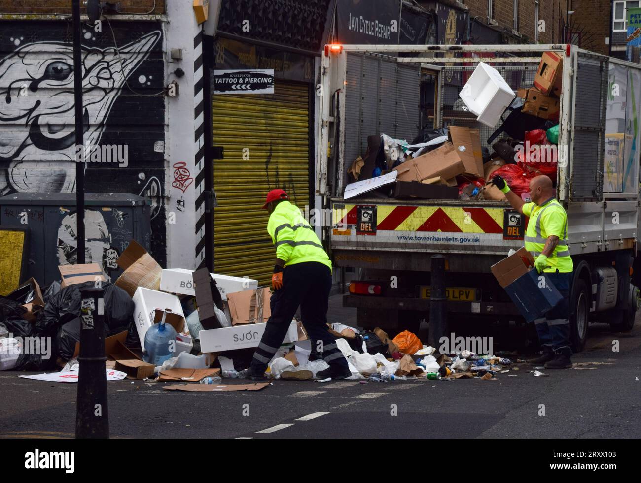 London, UK. 27th September 2023. Workers clear the huge piles of ...