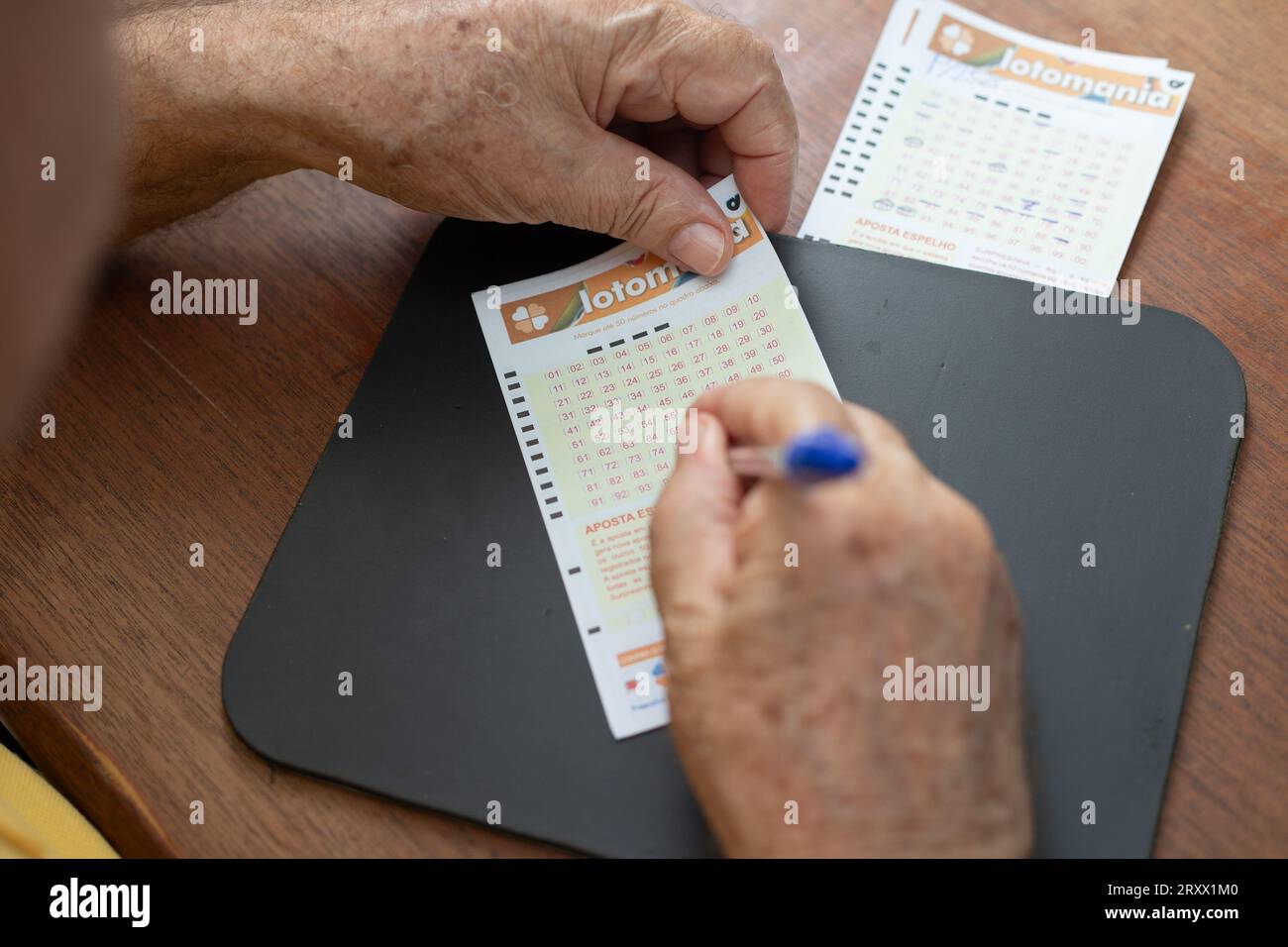 Elderly lottery ticket hi-res stock photography and images - Alamy