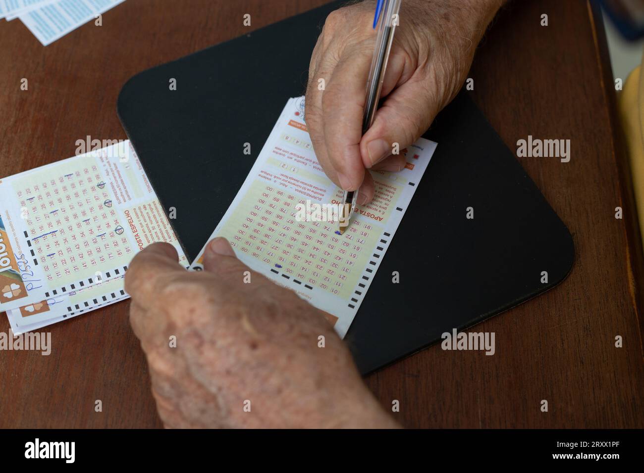 Elderly lottery ticket hi-res stock photography and images - Alamy
