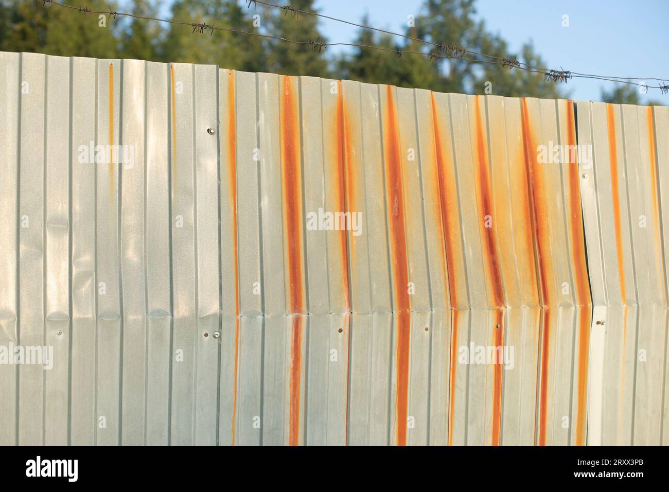 Steel fence around area. Stainless steel fence. Private territory. Rust ...