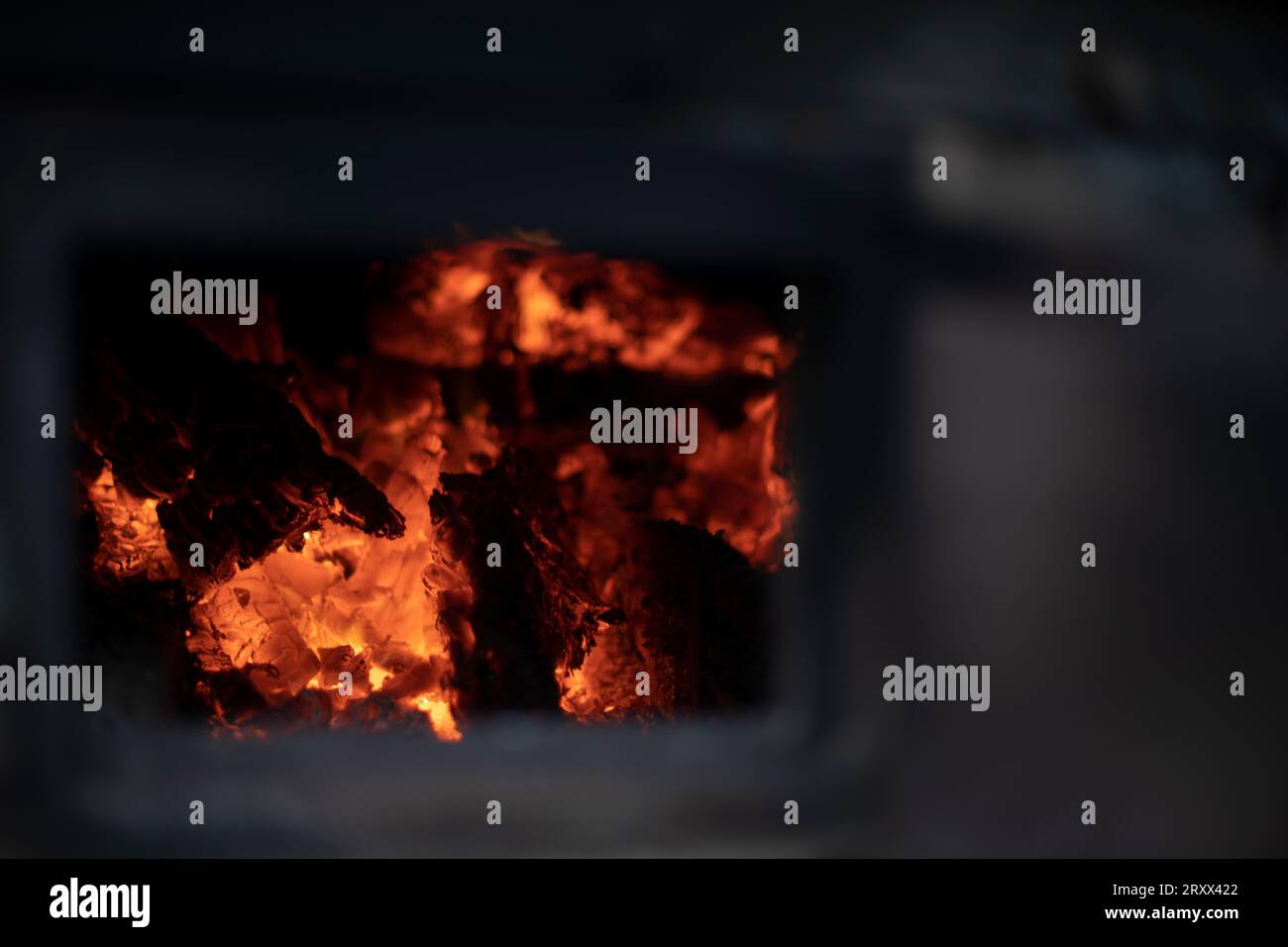 Burning of firewood in hearth. Flames of pyre. Texture of fire inside ...