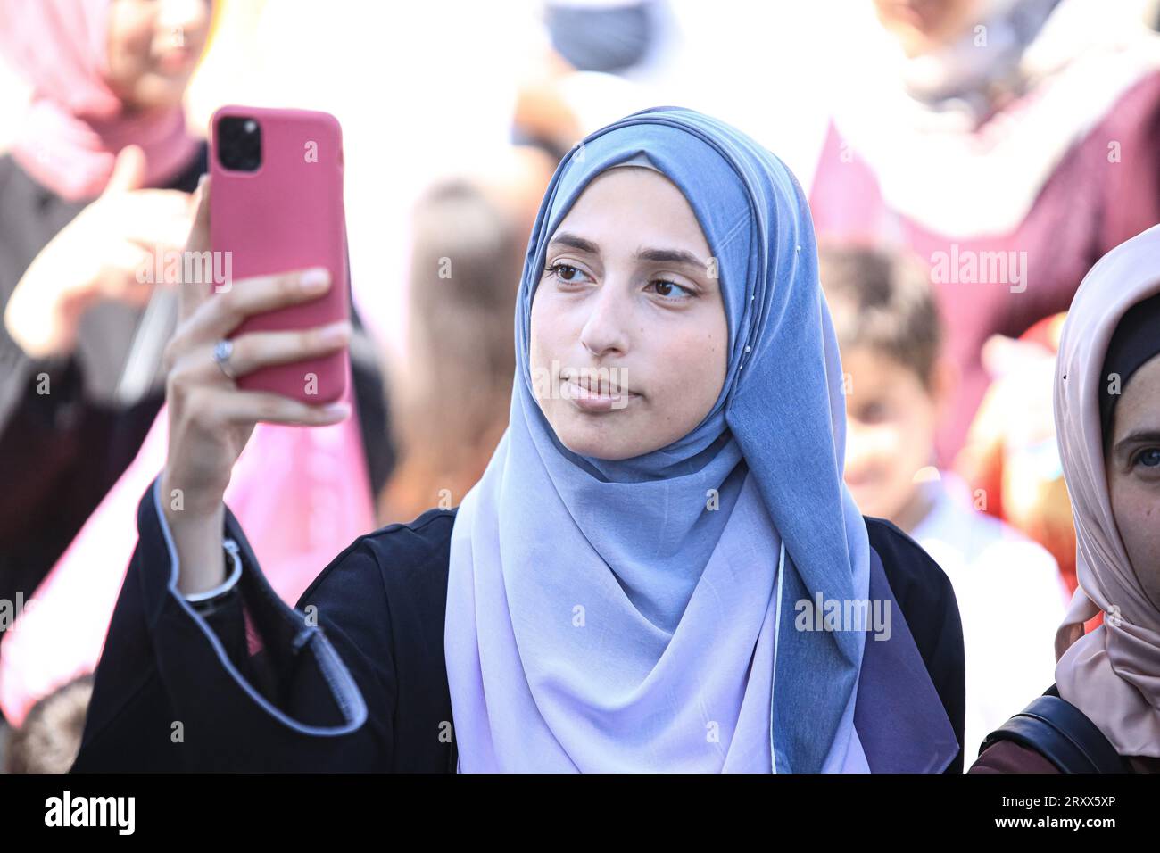 A Palestinian lady takes selfies as she commemorates the birth of the ...