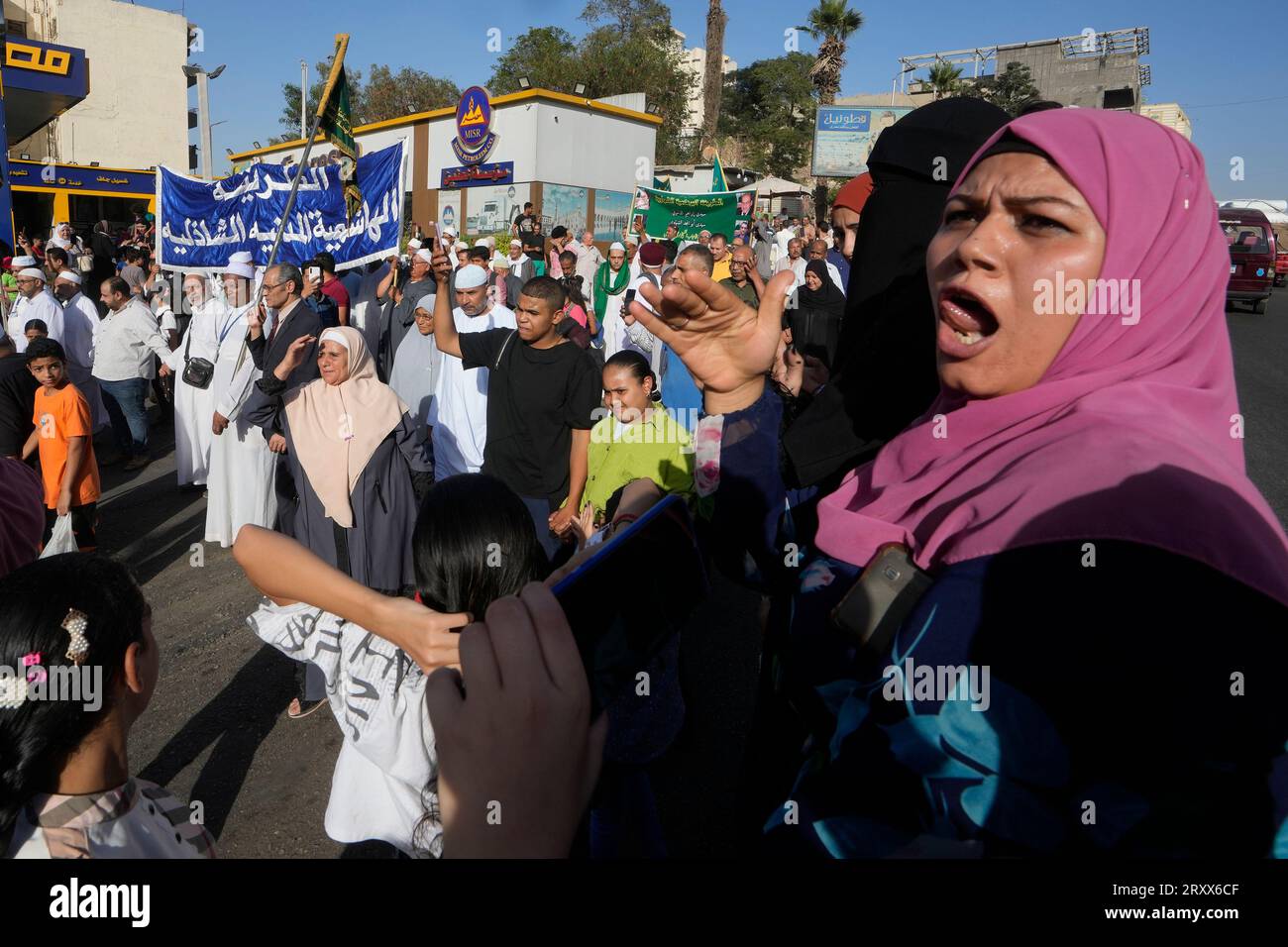 An Egyptian woman ululates as people parade to celebrate Moulid Al-Nabi ...