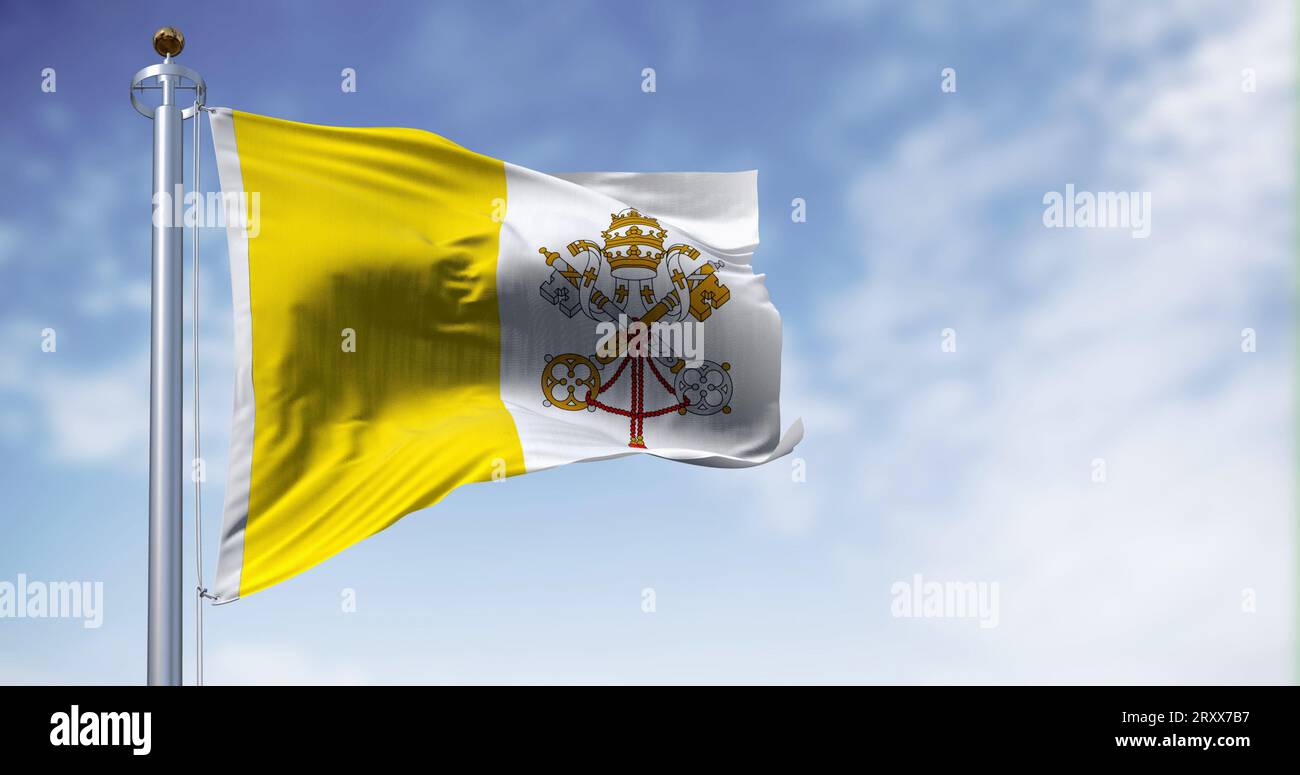 Flag of Vatican City waving in the wind on a clear day. Vertical ...