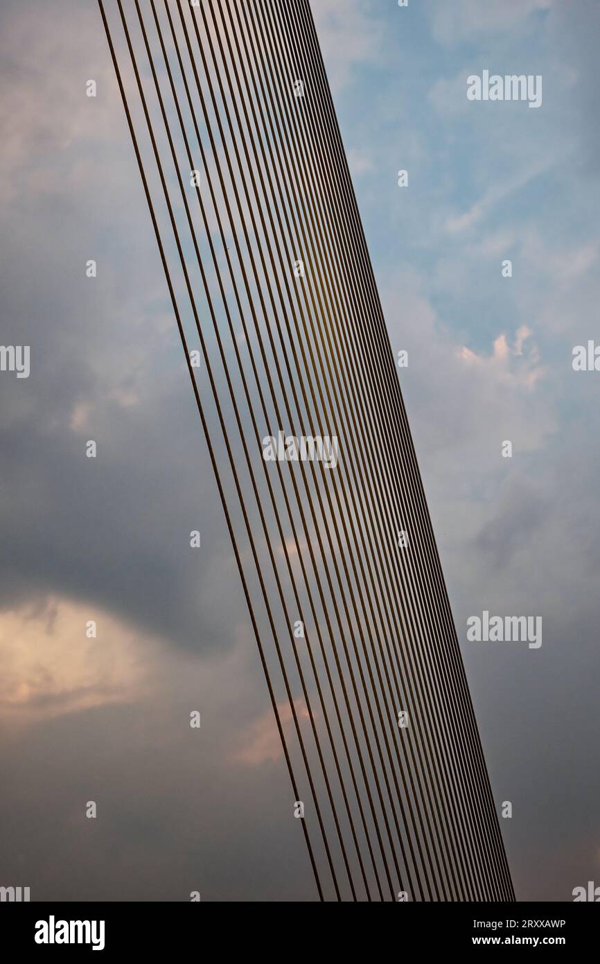 A suspension bridge's main cable, consisting of numerous smaller cables ...