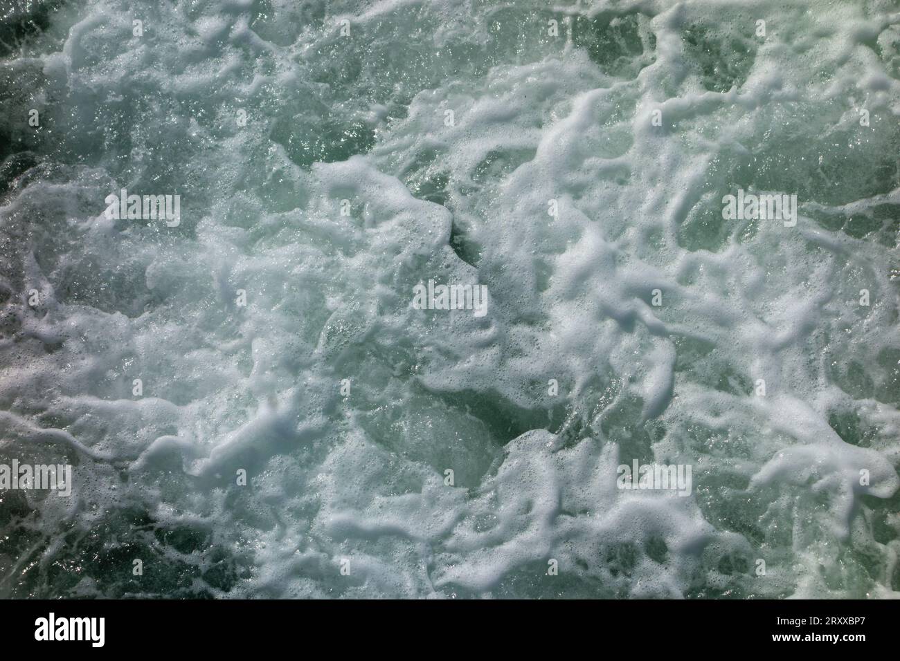 bubbling white water after a wave rolls through. Picture of pacific ...