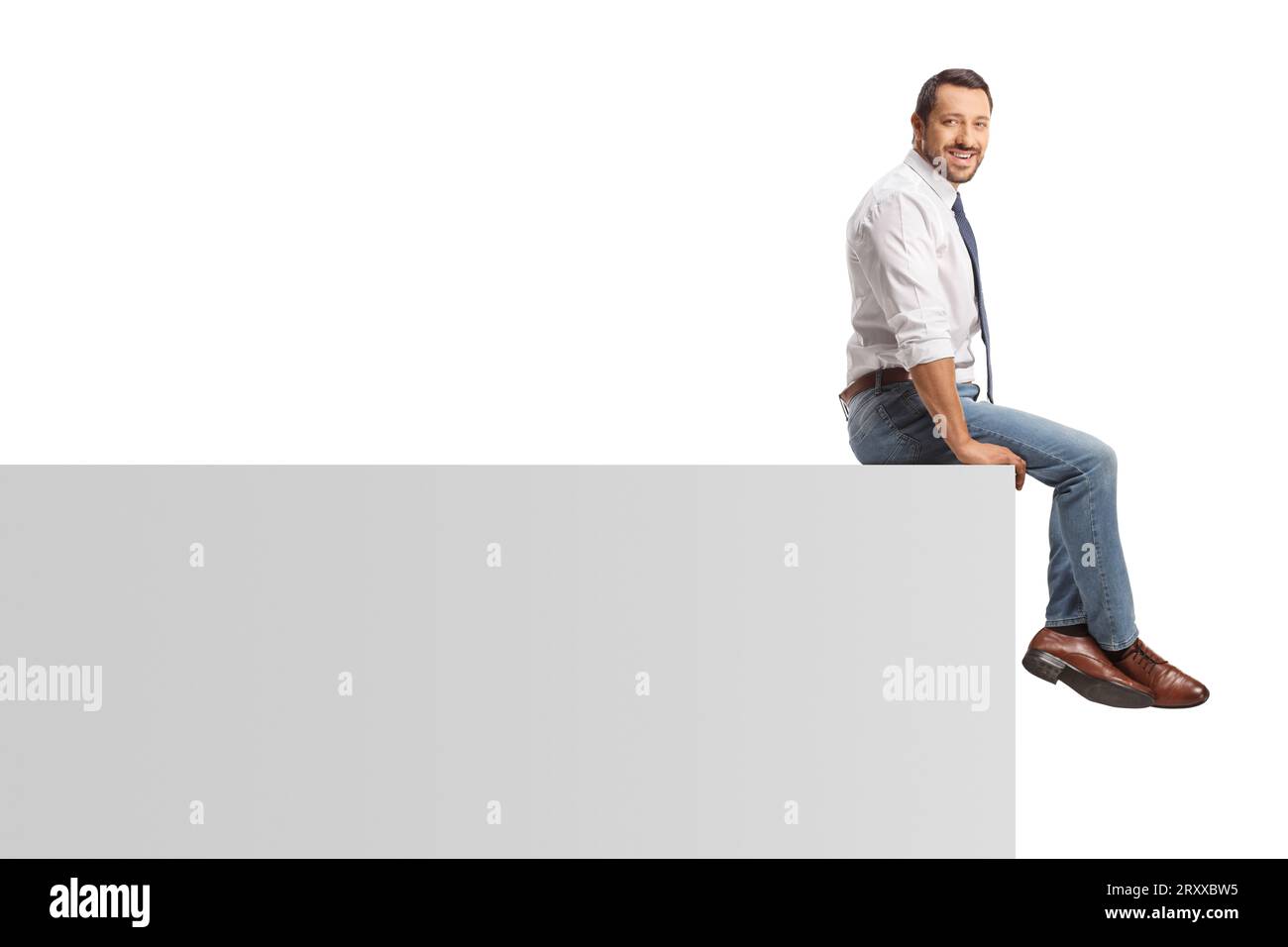 Man sitting wall hi-res stock photography and images - Alamy