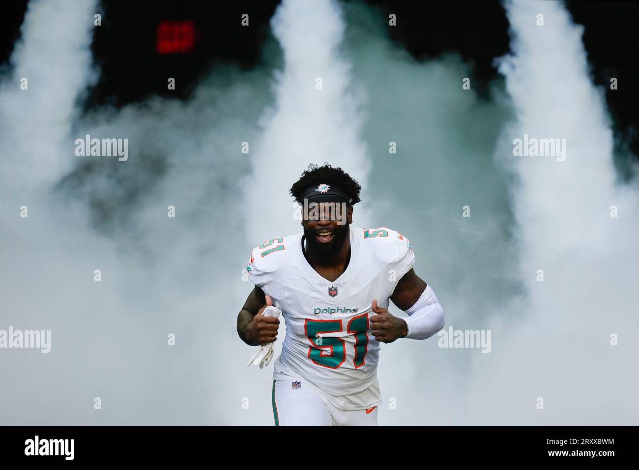 Miami Dolphins linebacker David Long Jr. (51) gives thumbs up as he is ...