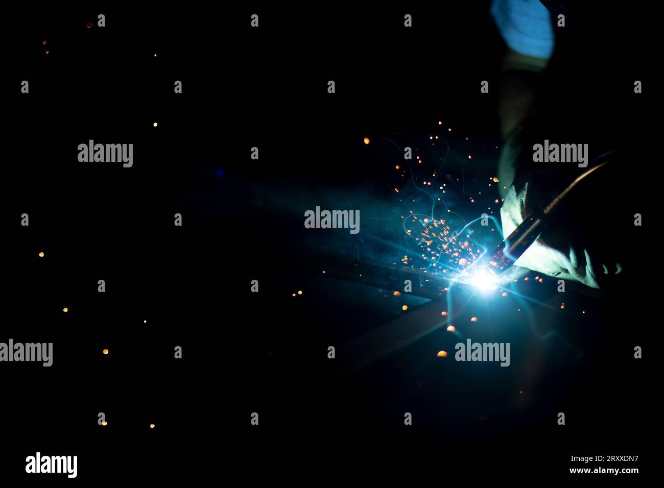 Metal welding. Welder's job. Highly hot steel. Fire in dark Stock Photo ...